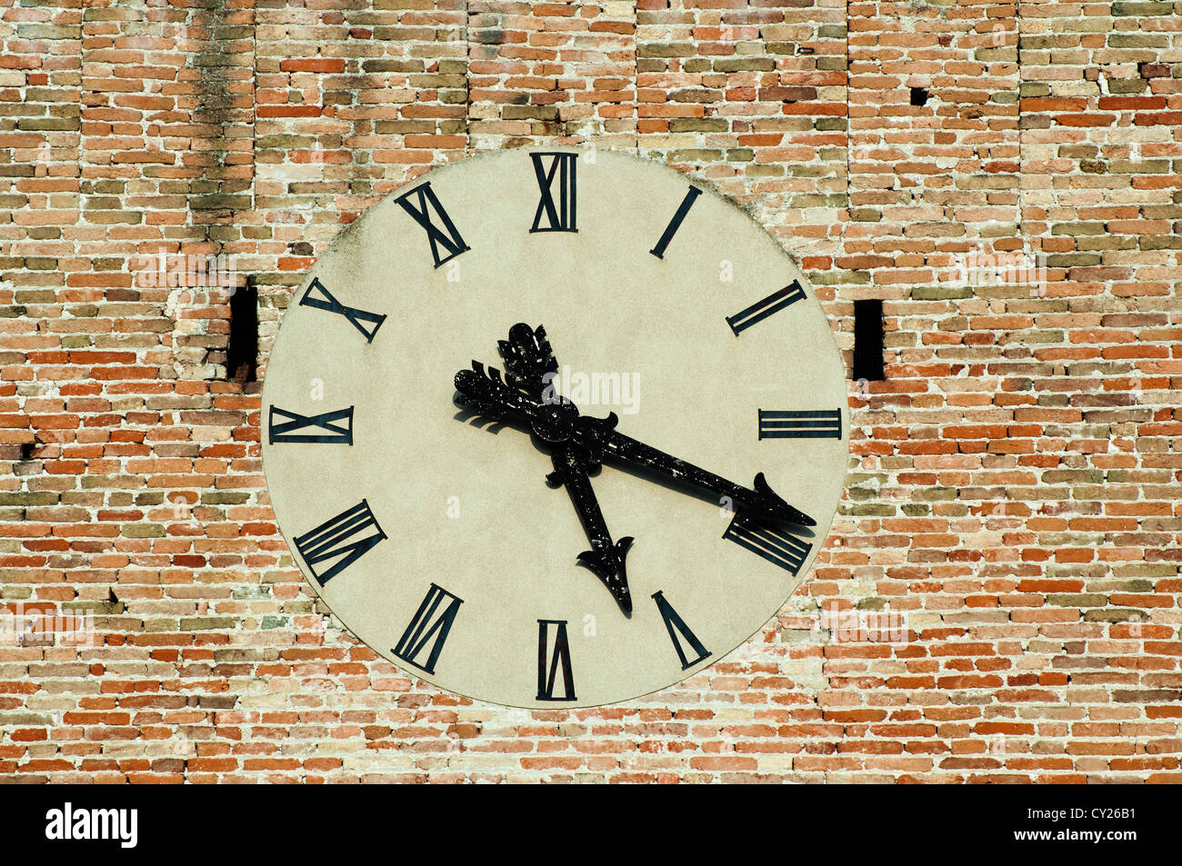Antique clock on a building. Ancient brick wall Stock Photo - Alamy