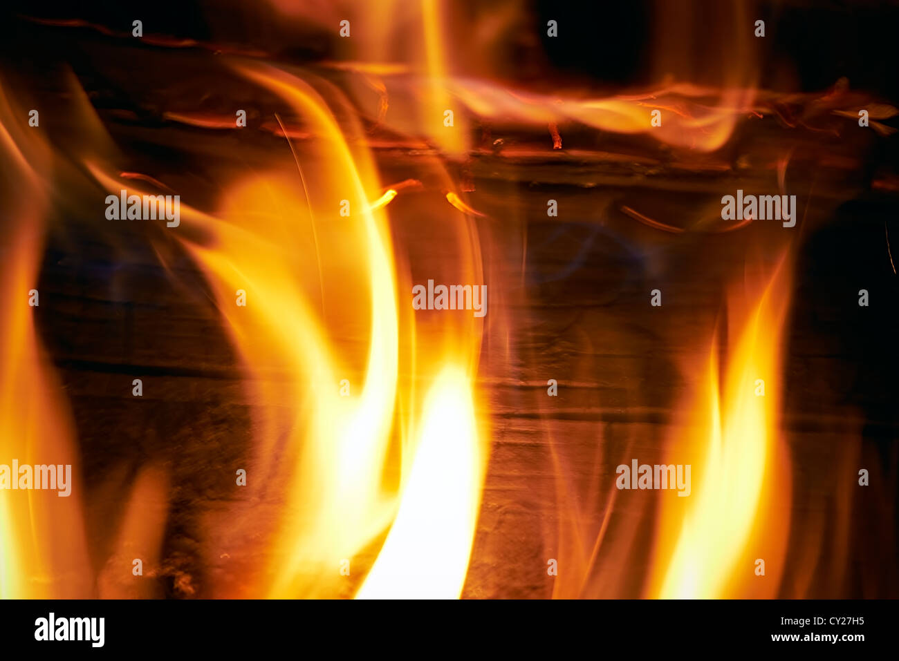 Inflaming fire in a fireplace Stock Photo - Alamy