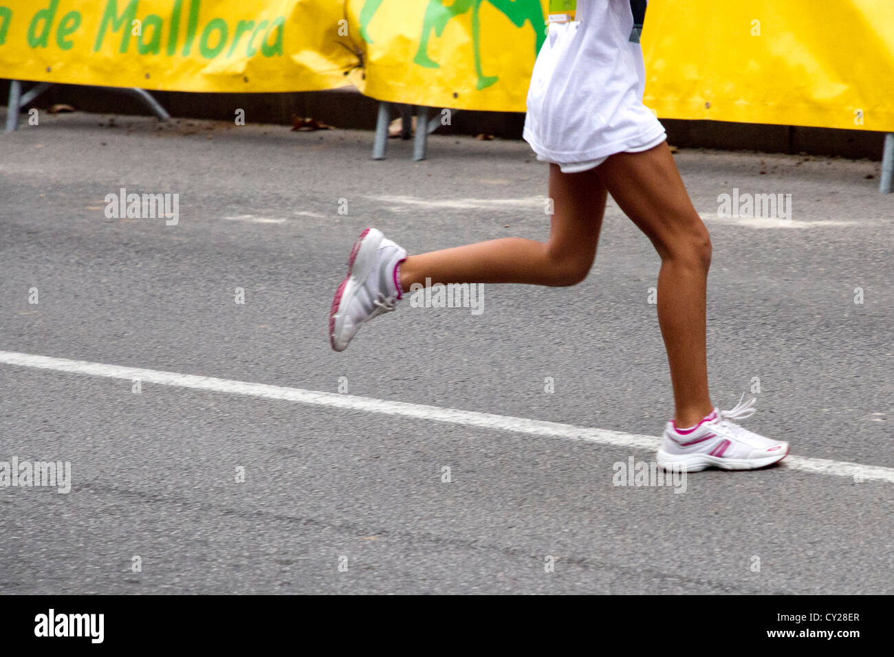 runner legs athlete Marathon running road Stock Photo - Alamy