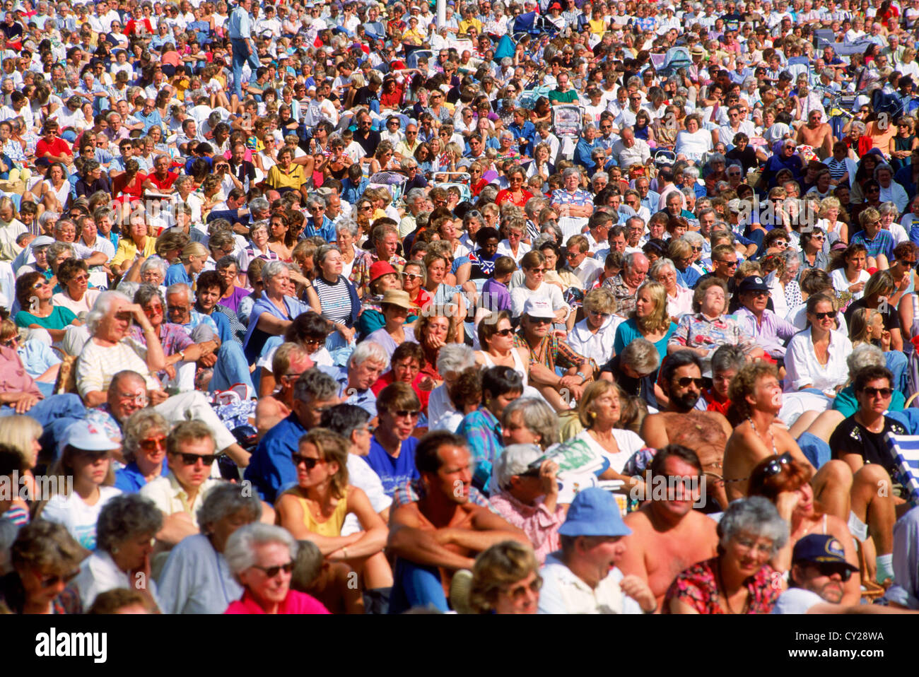 Large group of people listening to outdoor summer concert in Stockholm ...
