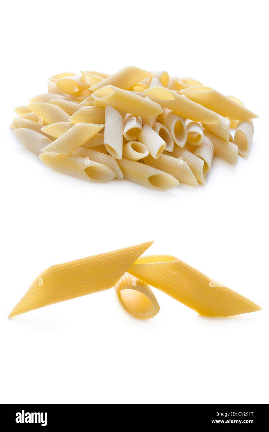 macro close up photograph of penne pasta dry uncooked isolated on a ...