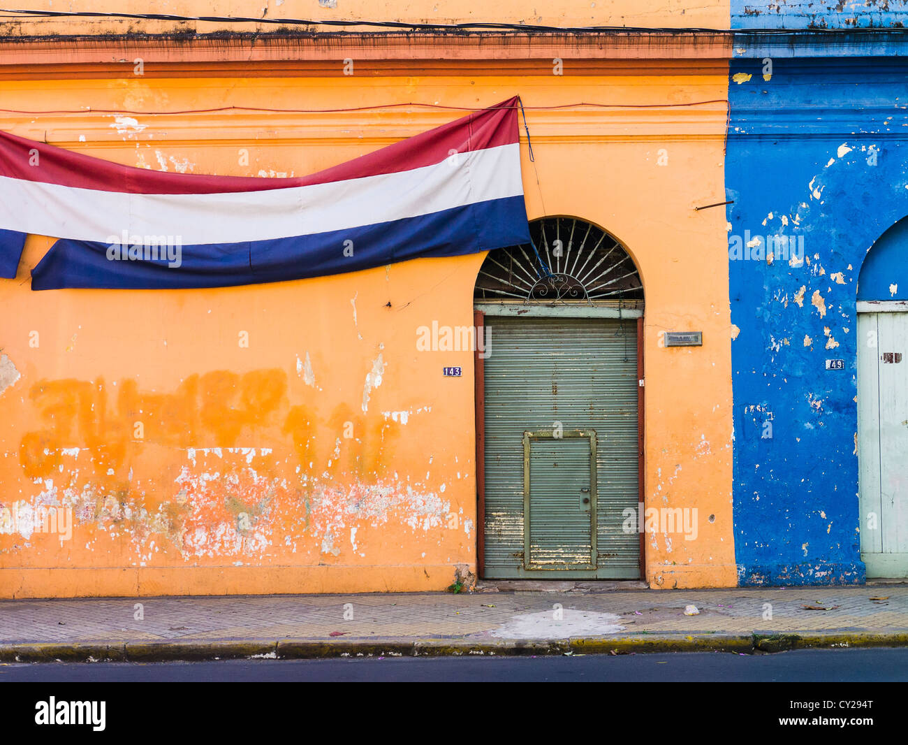 A banner representing the colors of the flag of Paraguay is draped ...