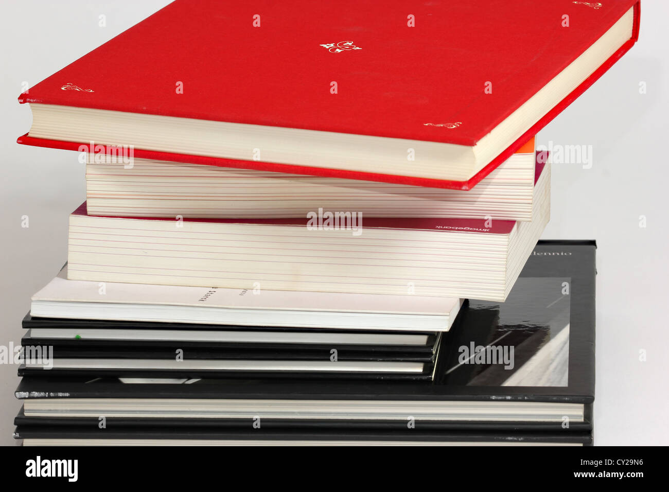 Books piled up hi-res stock photography and images - Alamy