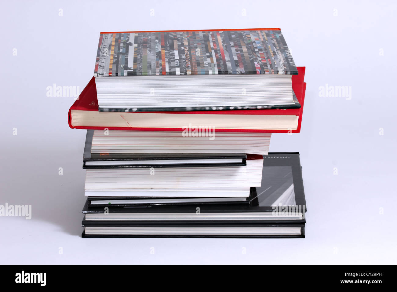 Books piled up hi-res stock photography and images - Alamy