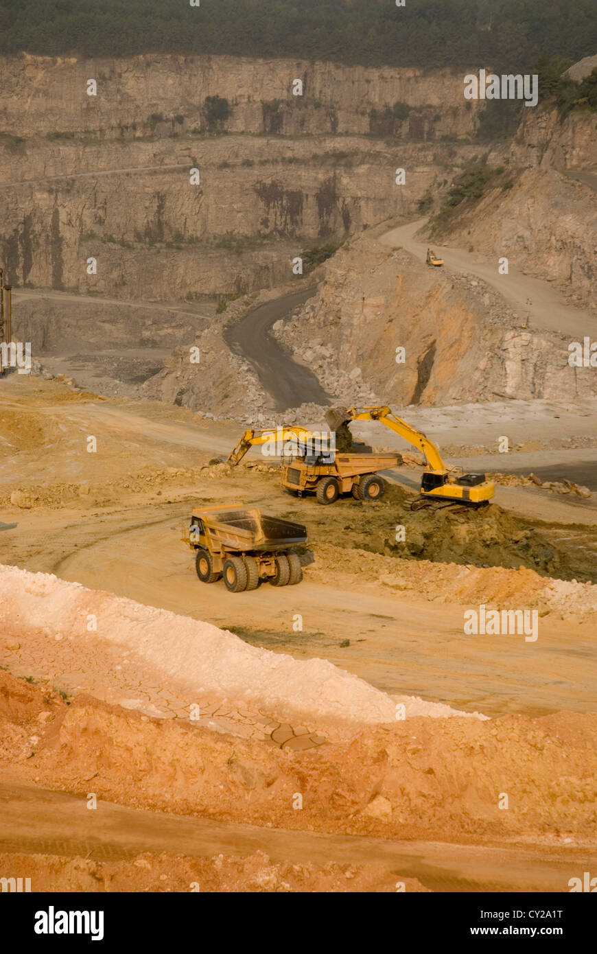 Granite mine and earth moving equipment Stock Photo - Alamy
