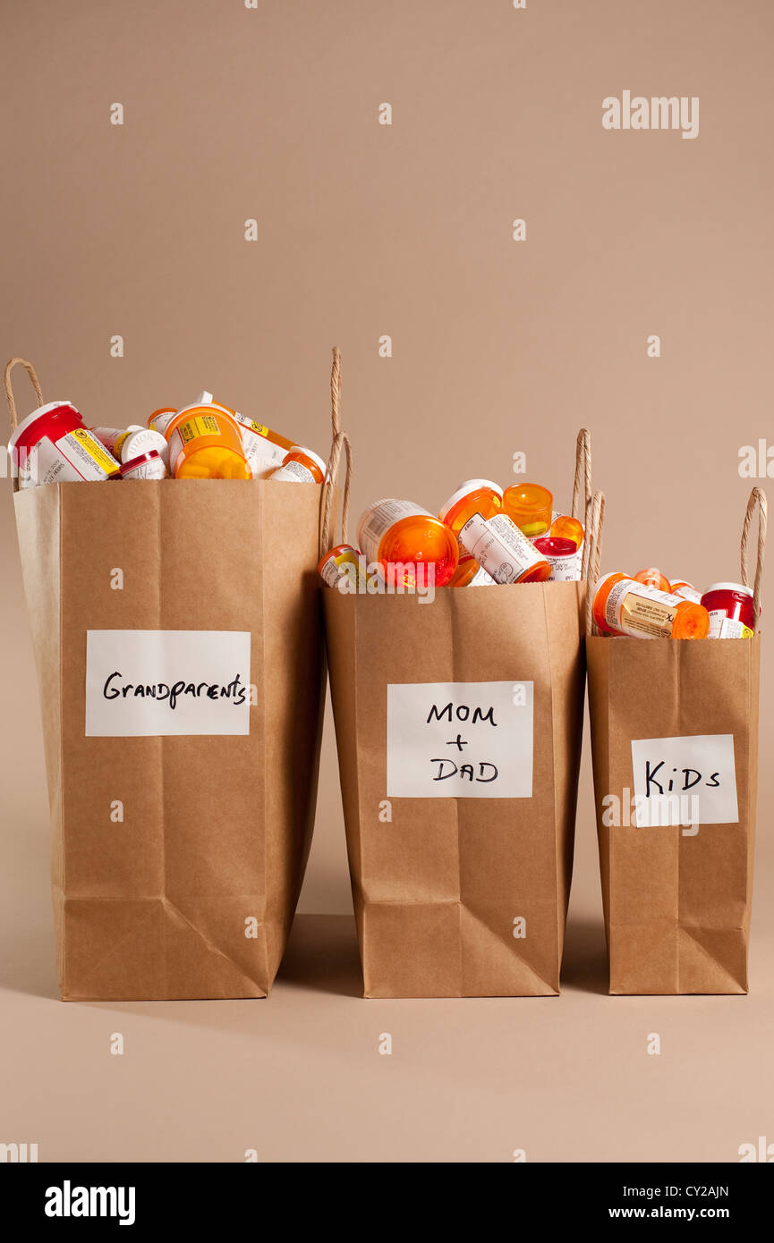 Brown paper bags stuffed with prescription medicines Stock Photo - Alamy
