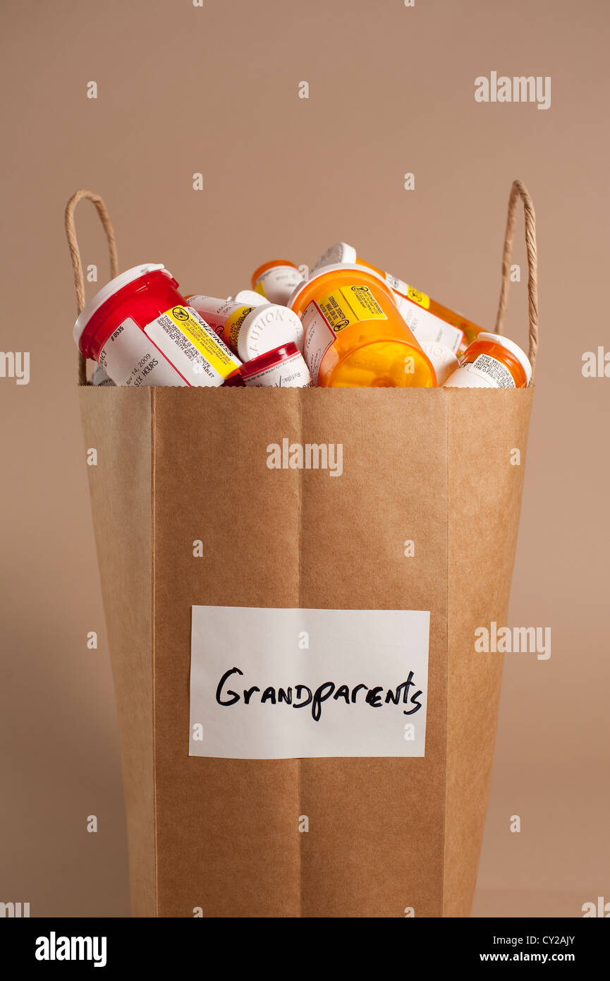 Brown paper bags stuffed with prescription medicines Stock Photo - Alamy
