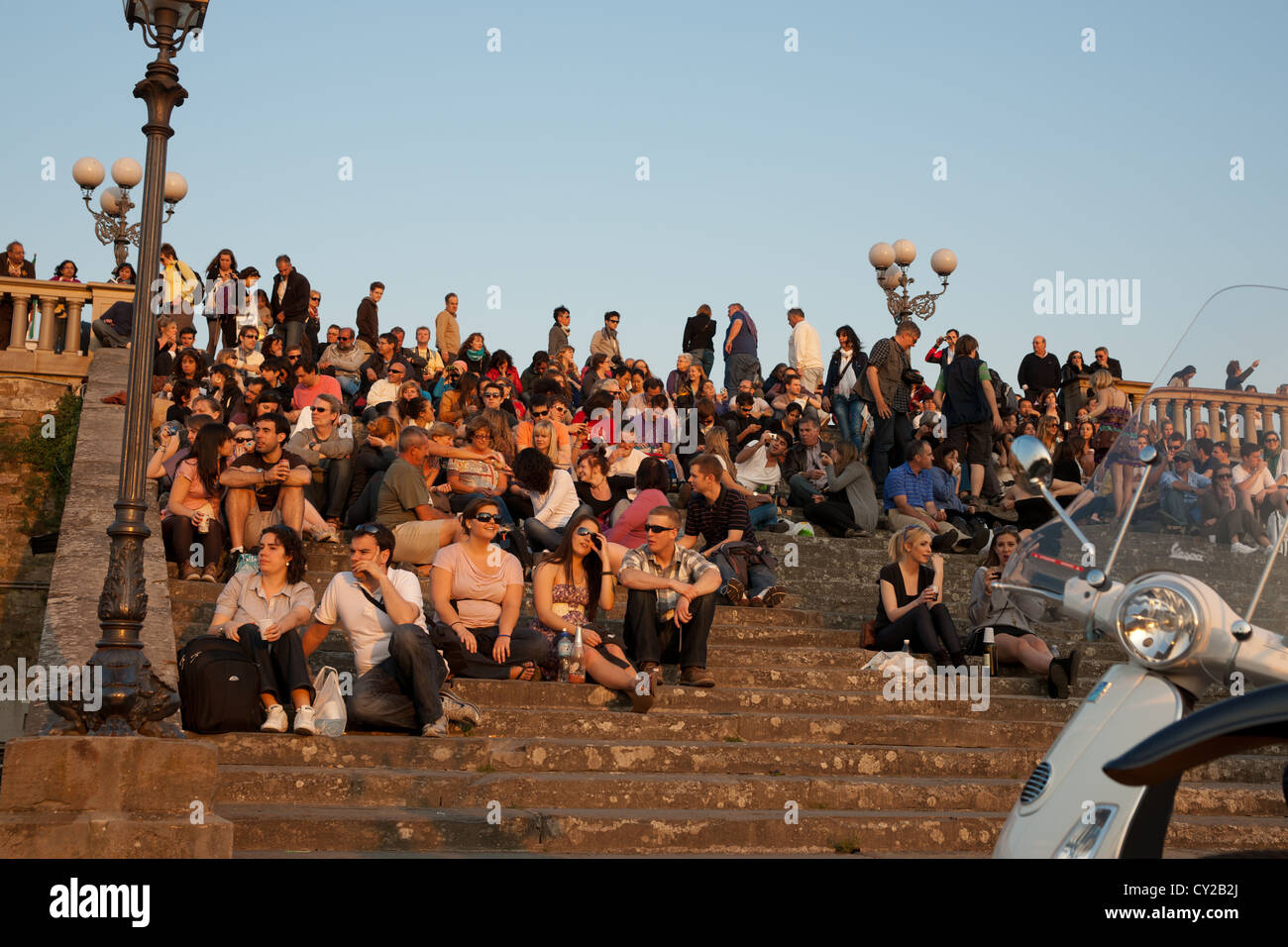 people on steps for a Florence sunset at the park at Pizzale ...