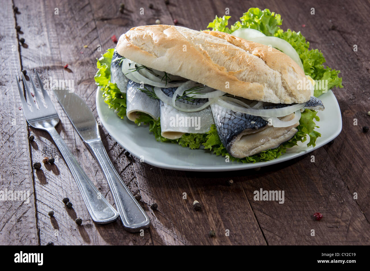 Fresh made Fish sandwich on wooden background Stock Photo - Alamy