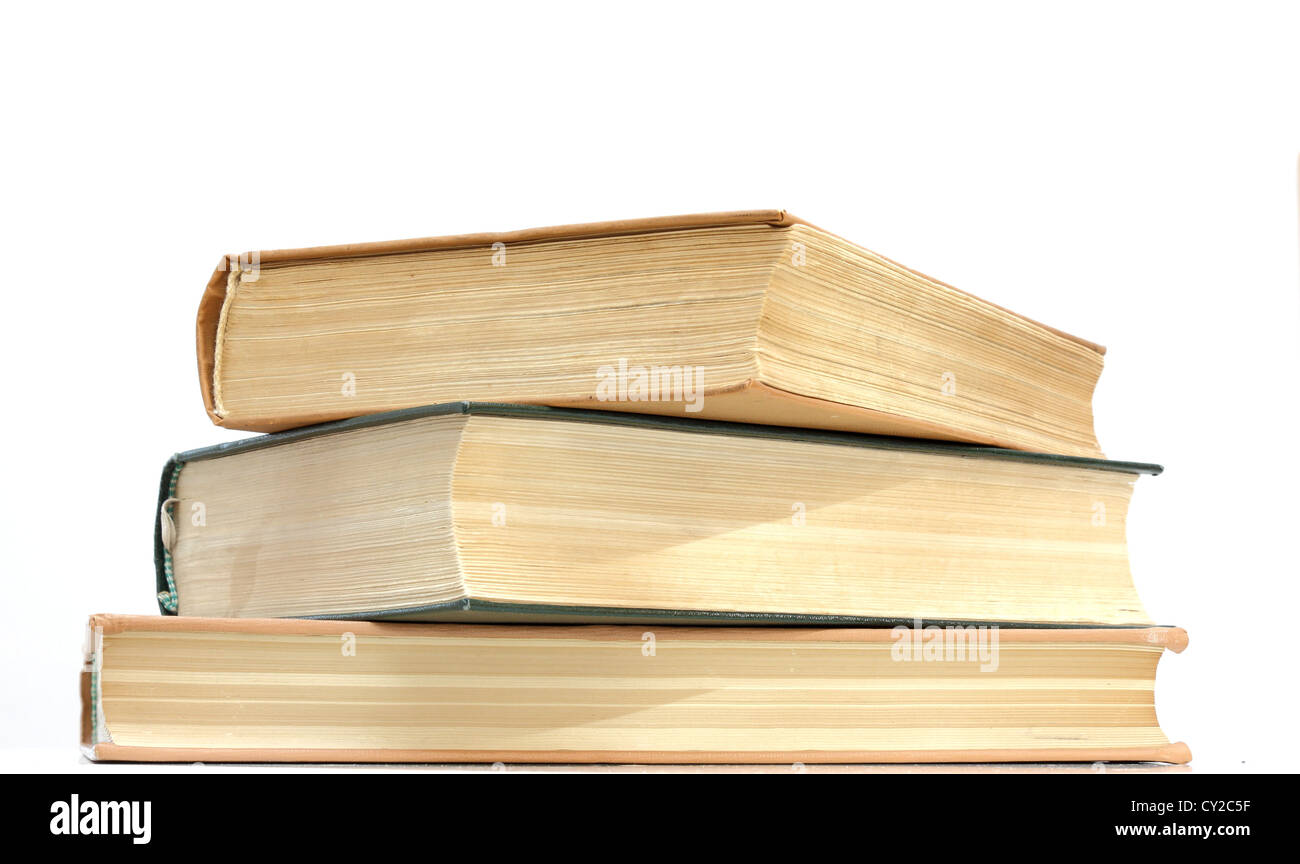 arrangement of three old boock Stock Photo - Alamy