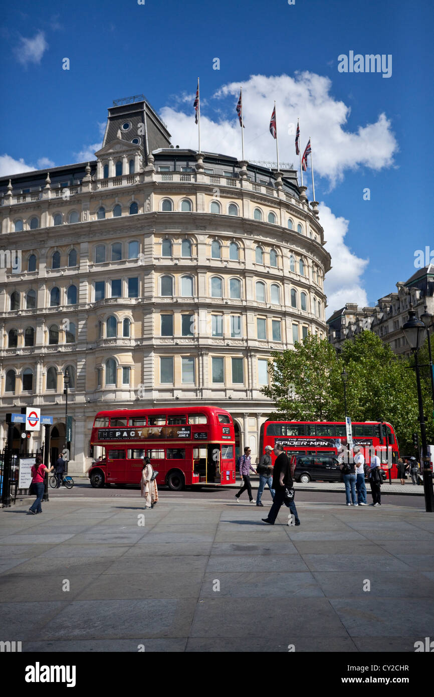 Trafalgar Square street scene, with the Grand Buildings Building in the ...