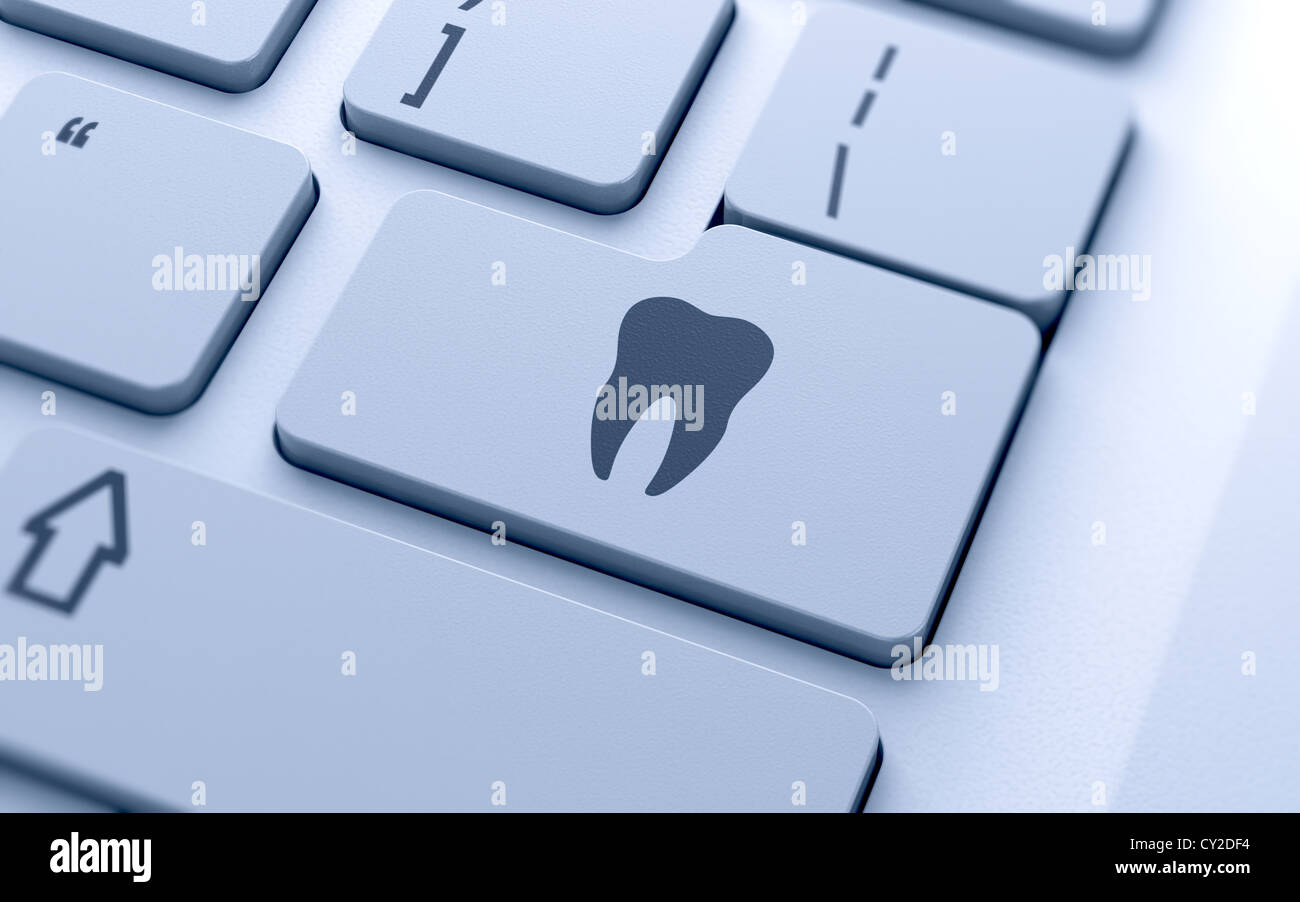 Tooth sign button on keyboard with soft focus Stock Photo - Alamy
