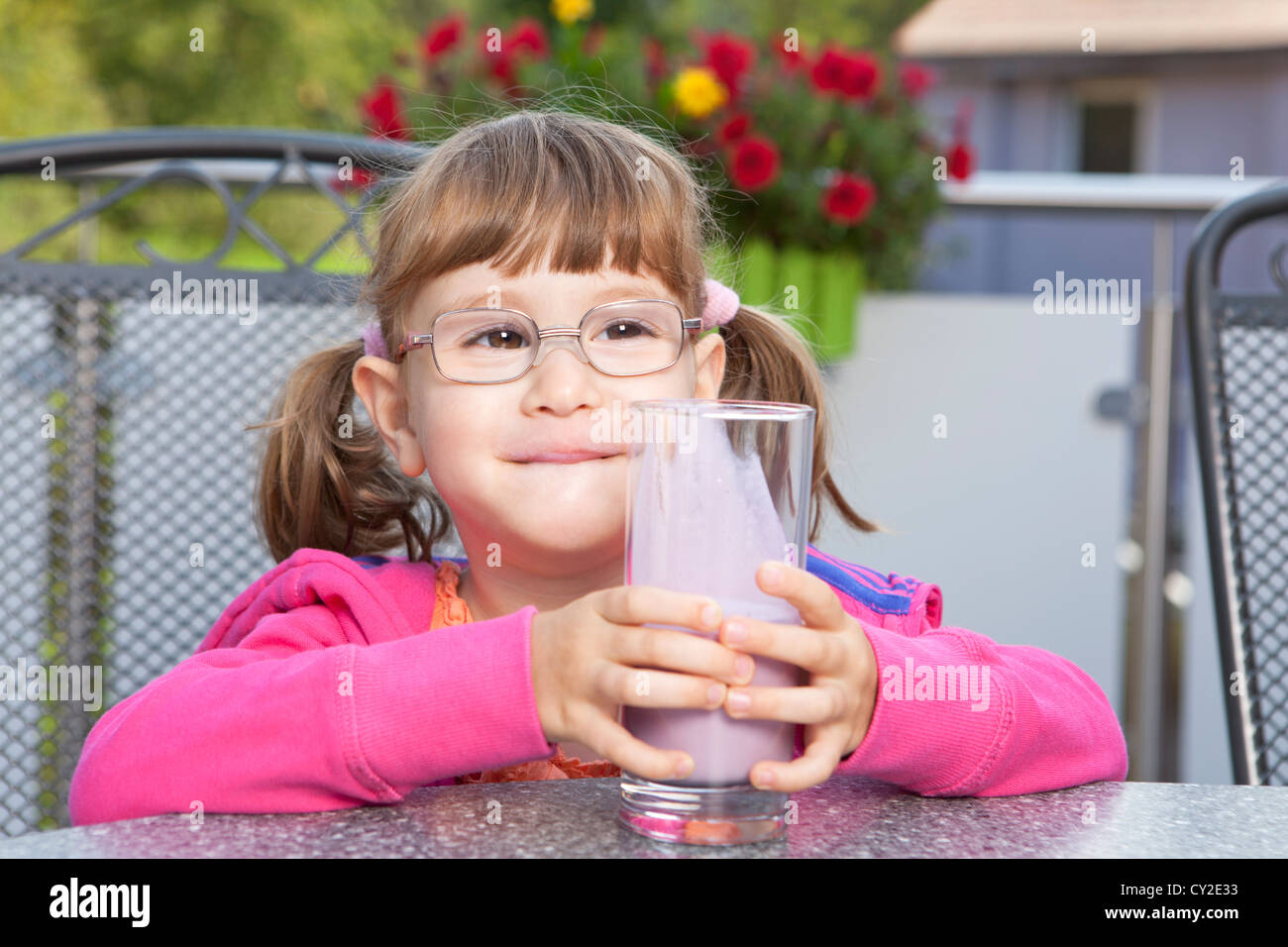 Little girl enjoying its milkshake Stock Photo - Alamy Little girl enjoying its milkshake Stock Photo - Alamy