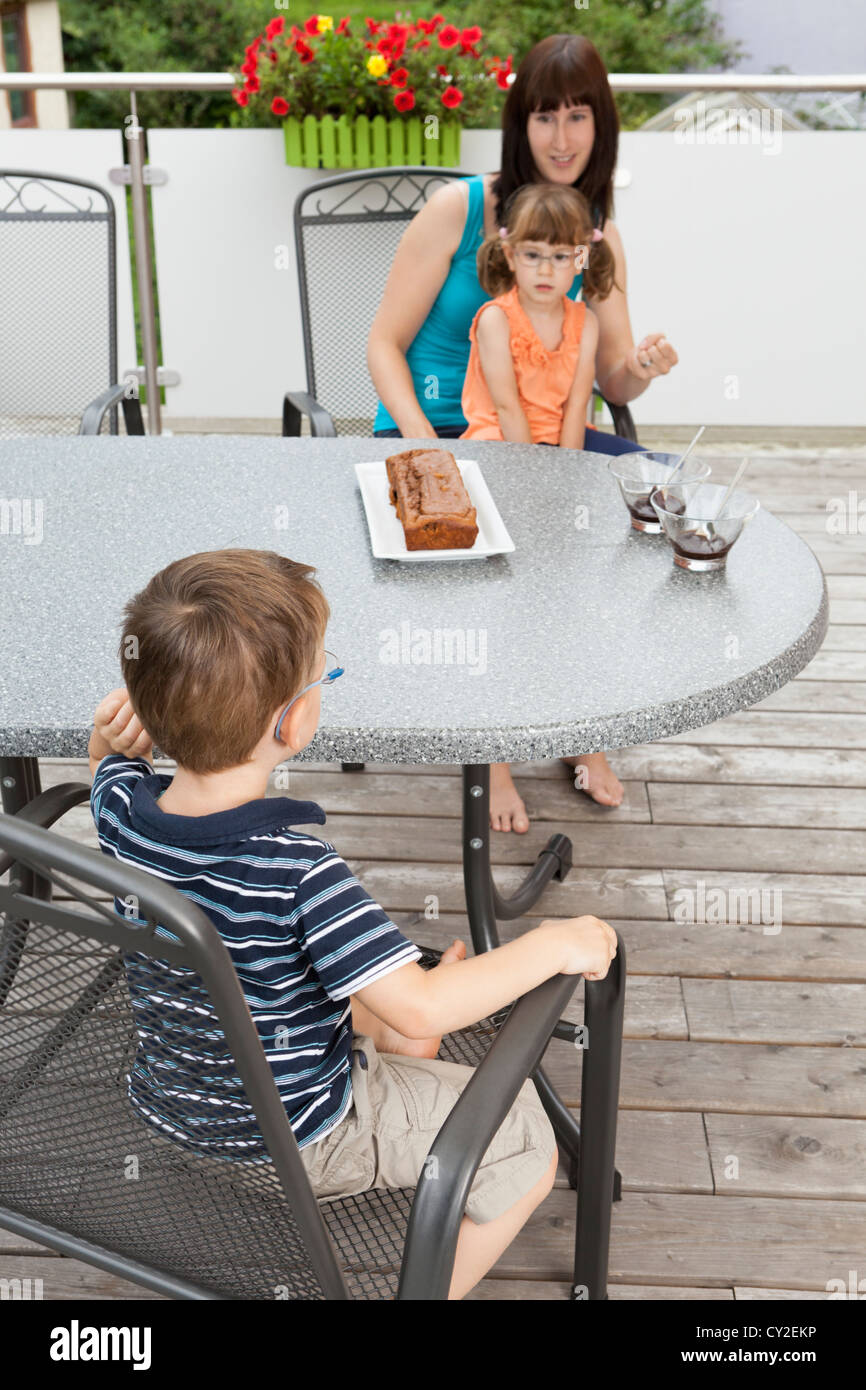 Children waiting to get a chocolate cake Stock Photo - Alamy