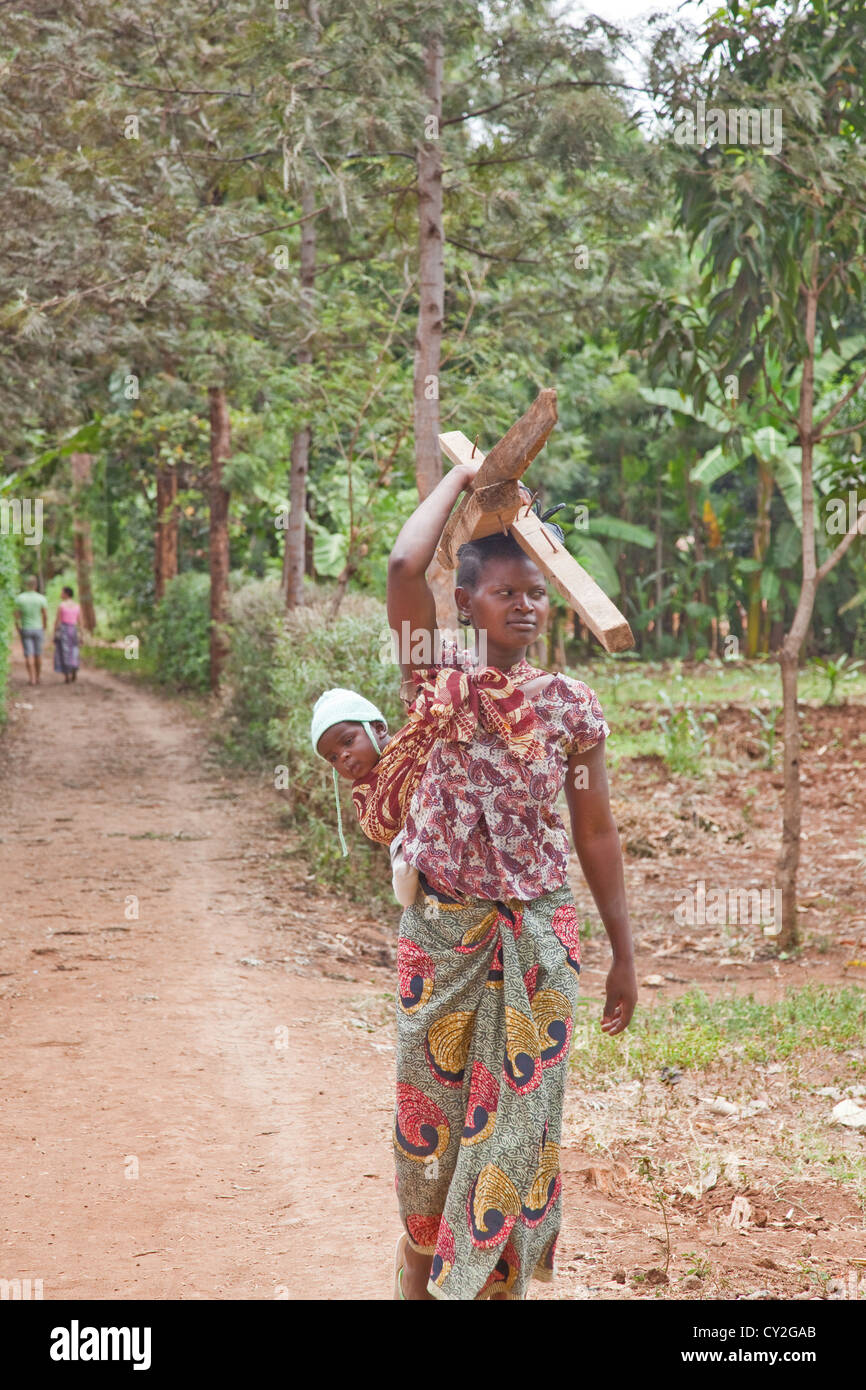 Child carrying wood hi-res stock photography and images - Alamy
