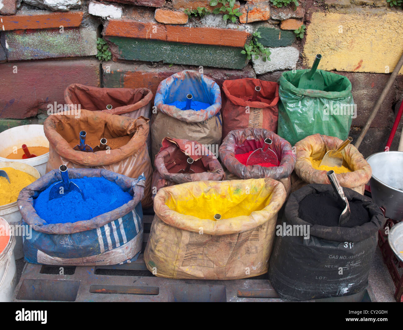 Color pigments on sale in buckets and canvas sacks for mixing your own ...