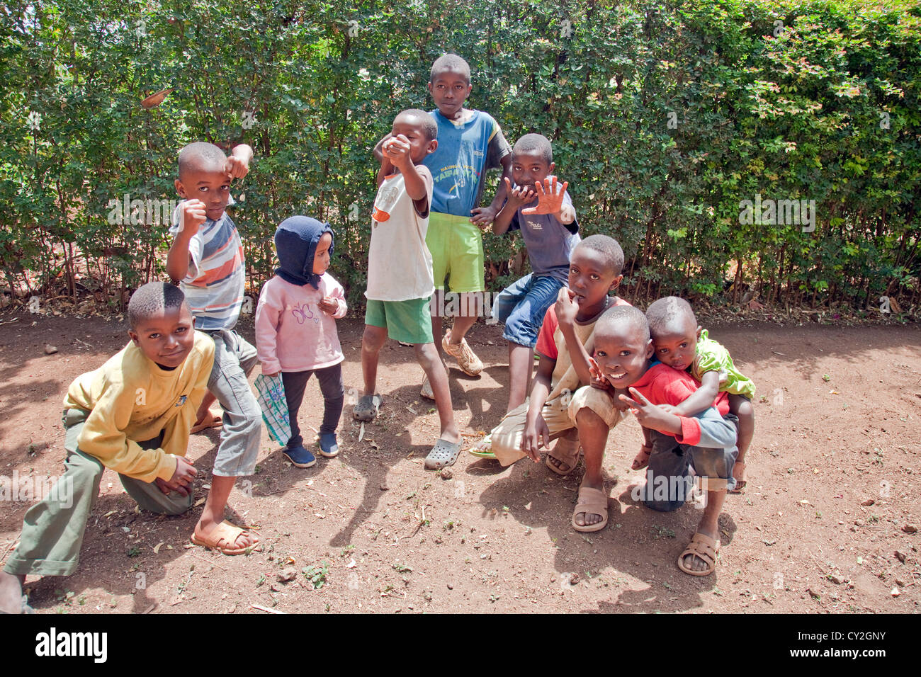 Group of nine African Orphan Children playing on the street in Moshi ...