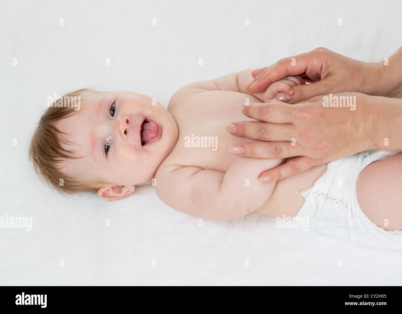 Baby getting massage hi-res stock photography and images - Alamy