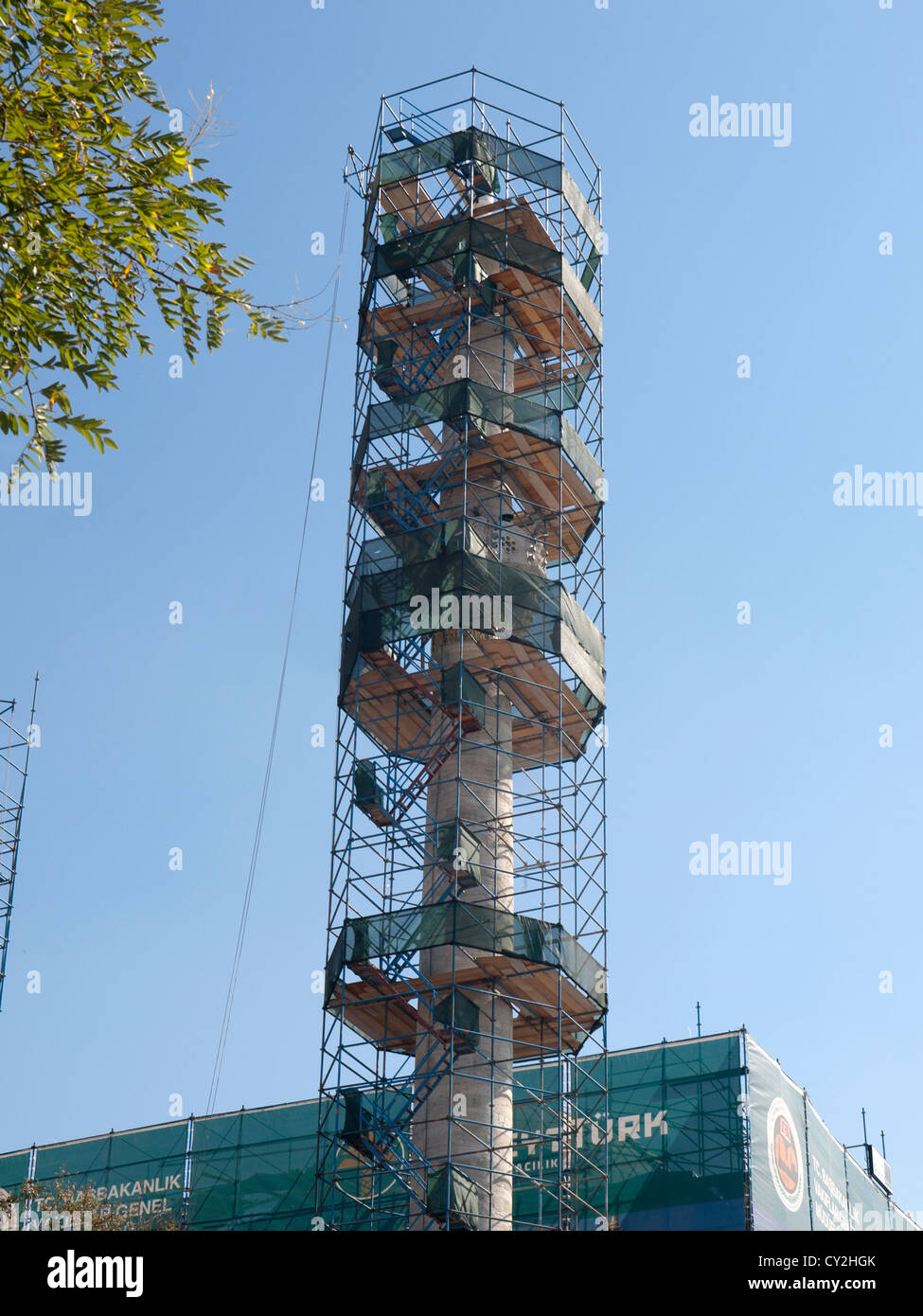 Scaffolding raised around a minaret for repair works or restoration in ...