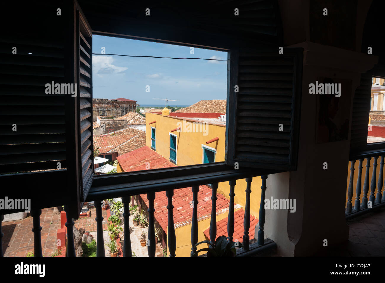 Cuba, colors of Trinidad de Cuba, through silhouette window Stock Photo ...