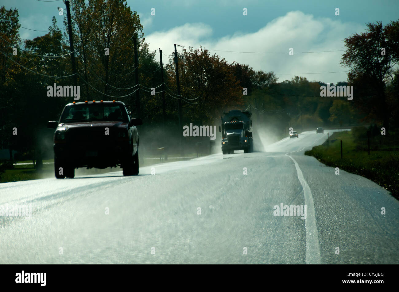 Rural wet road hi-res stock photography and images - Alamy
