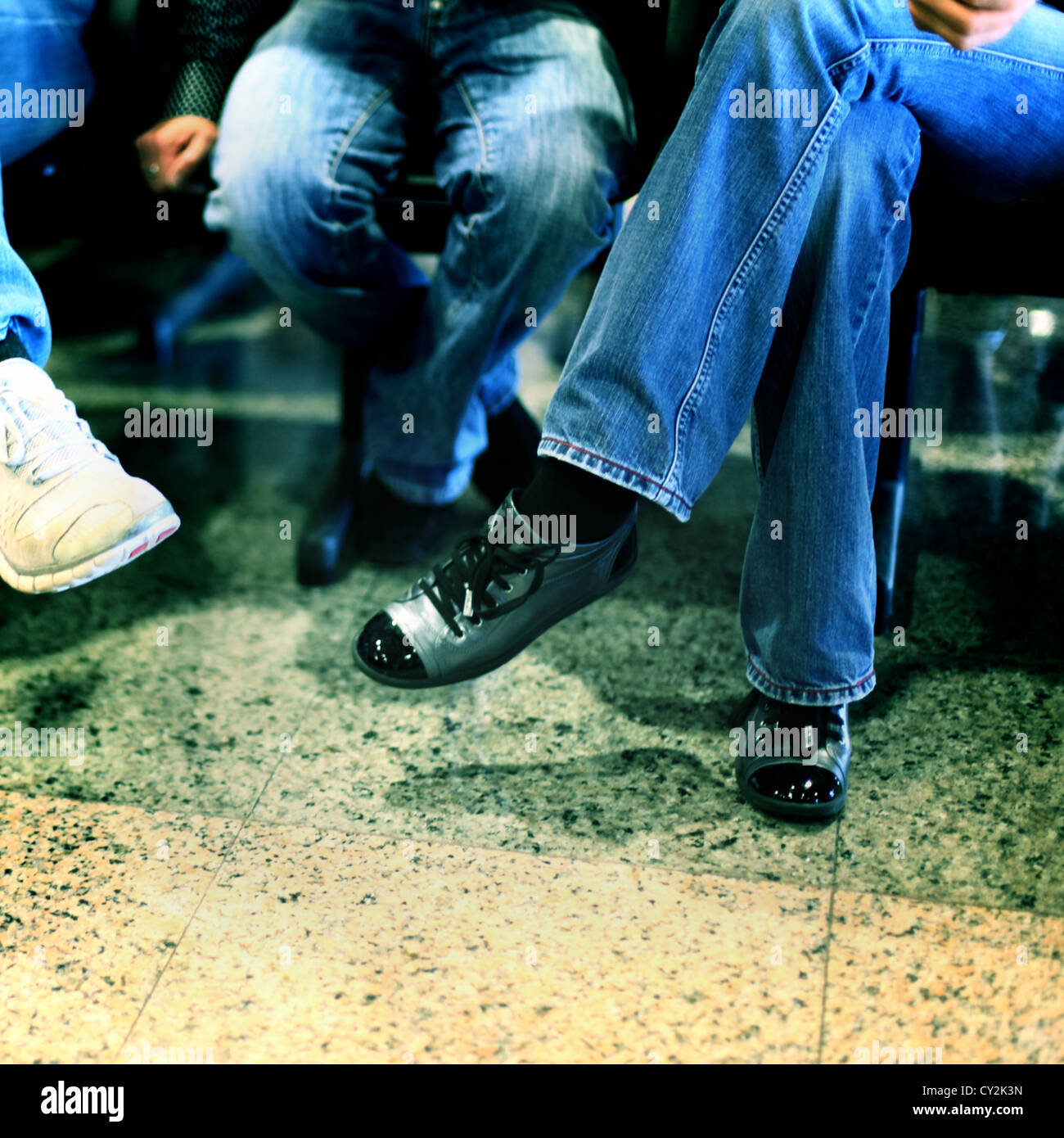 waiting arrival legs close up Stock Photo - Alamy