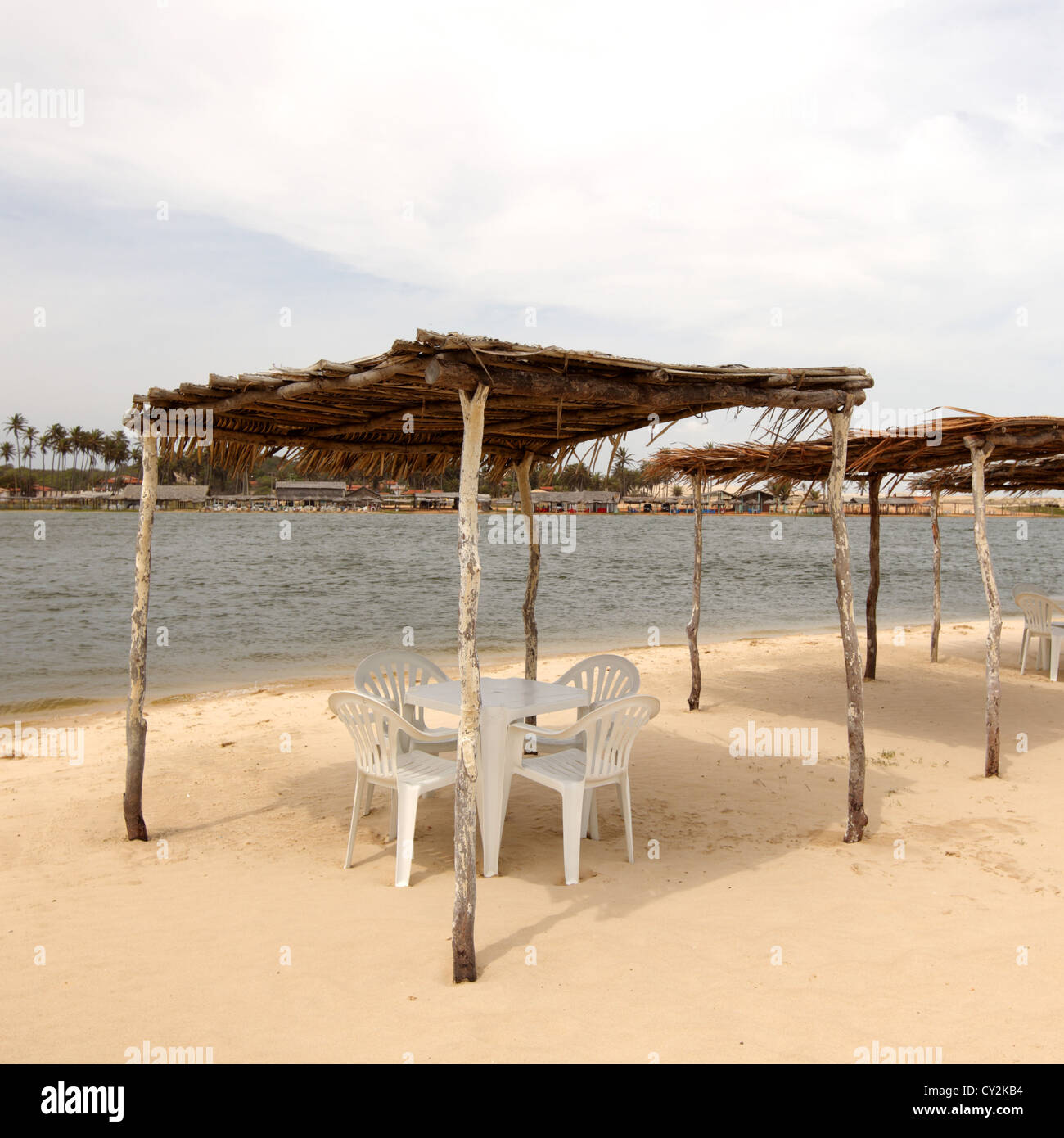 awning in sand near water Stock Photo - Alamy