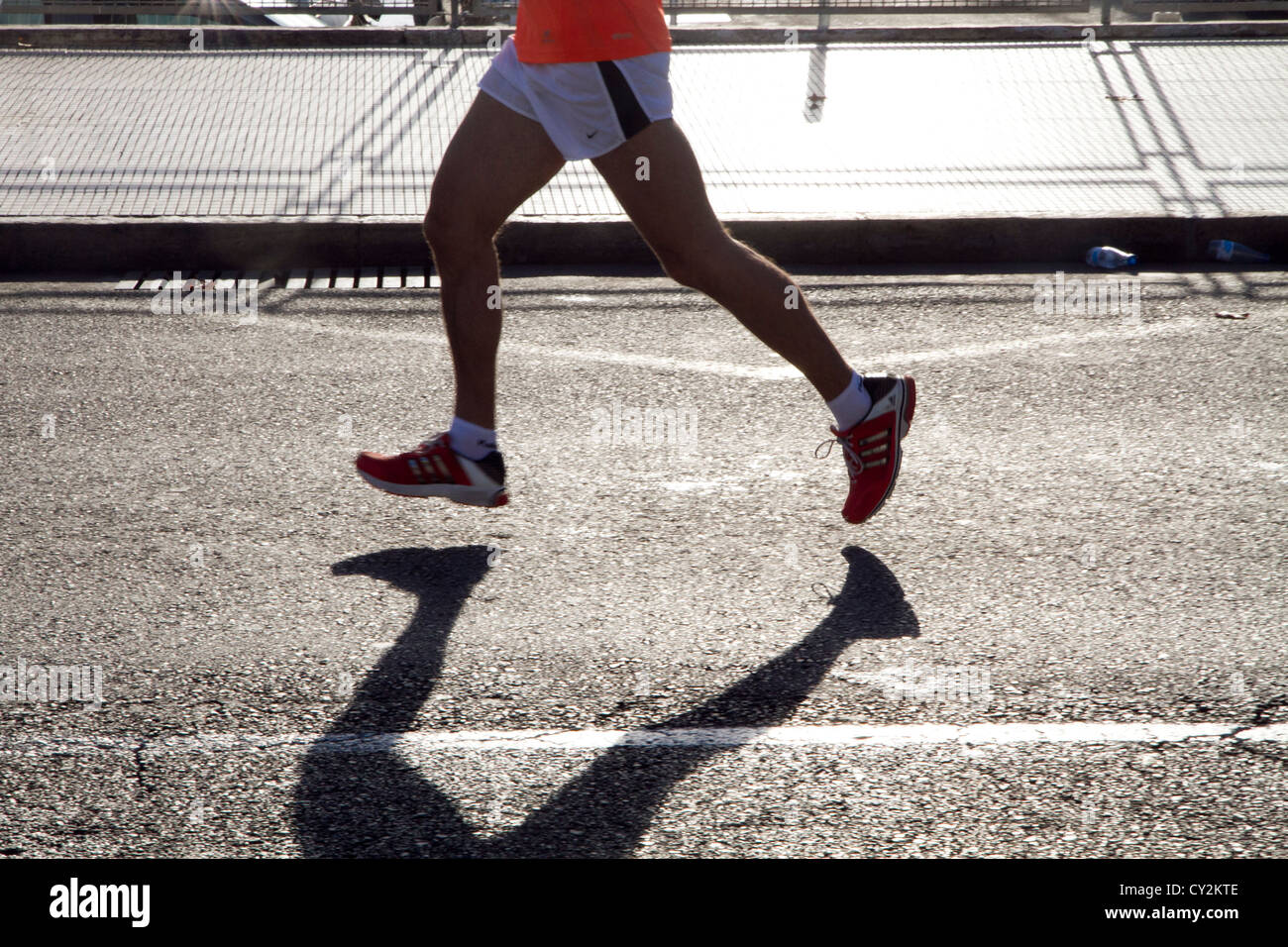 runner legs shadow athlete Marathon running race Stock Photo - Alamy