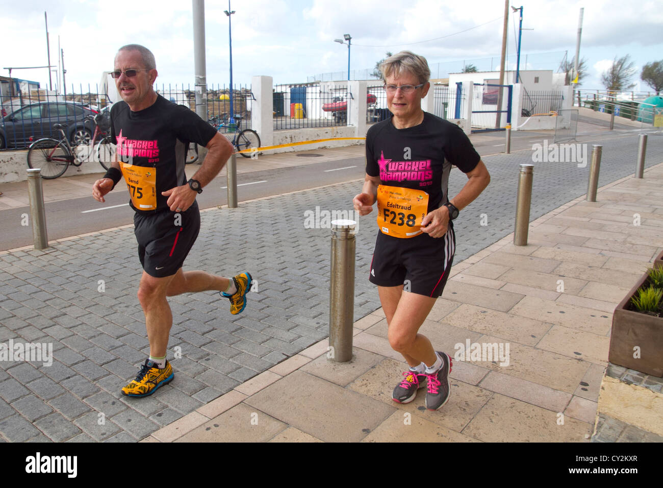 Marathon runners race athletes running on road Palma de Mallorca Spain ...