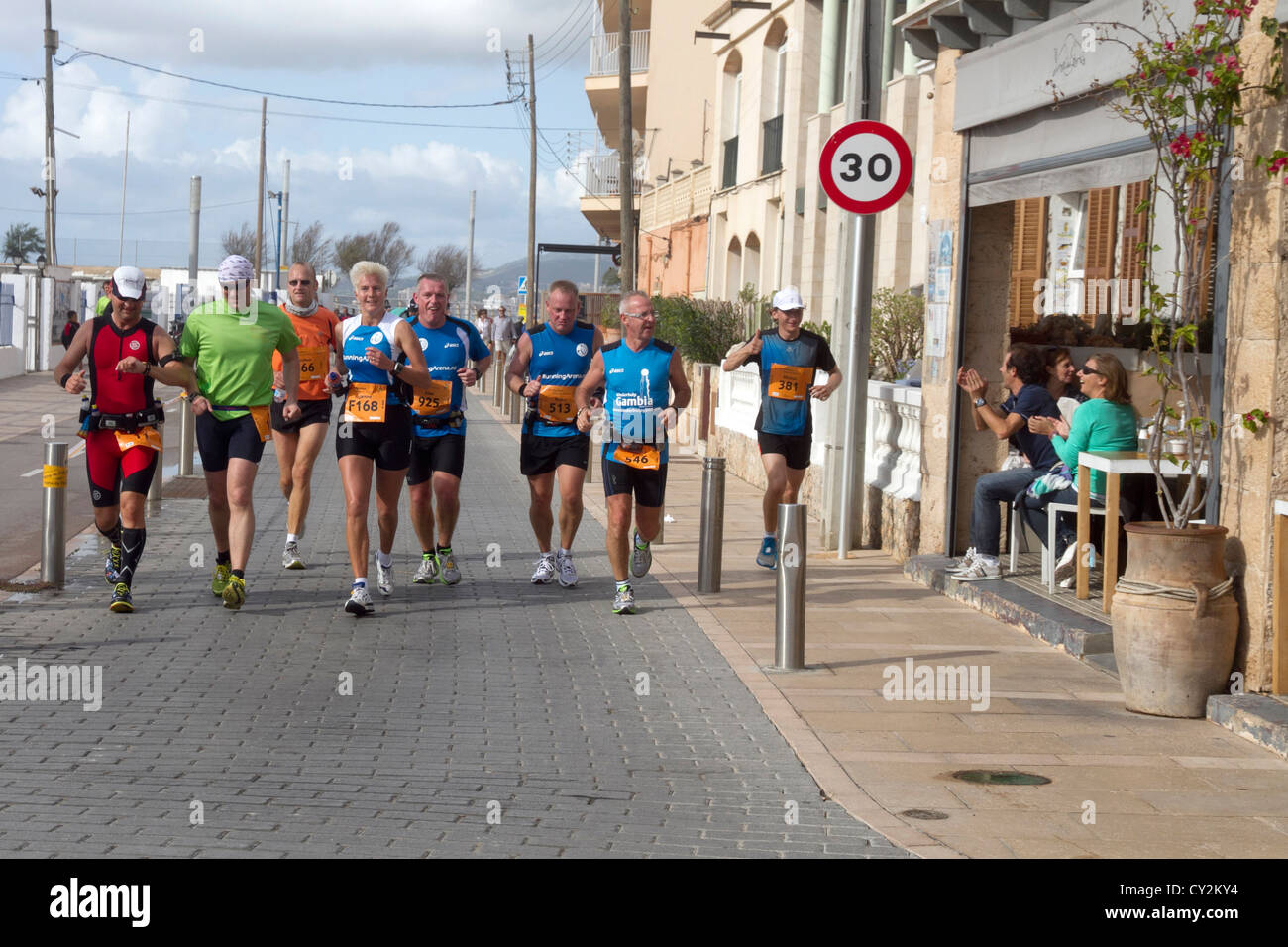 Marathon runners men race athletes running on road Palma de Mallorca ...