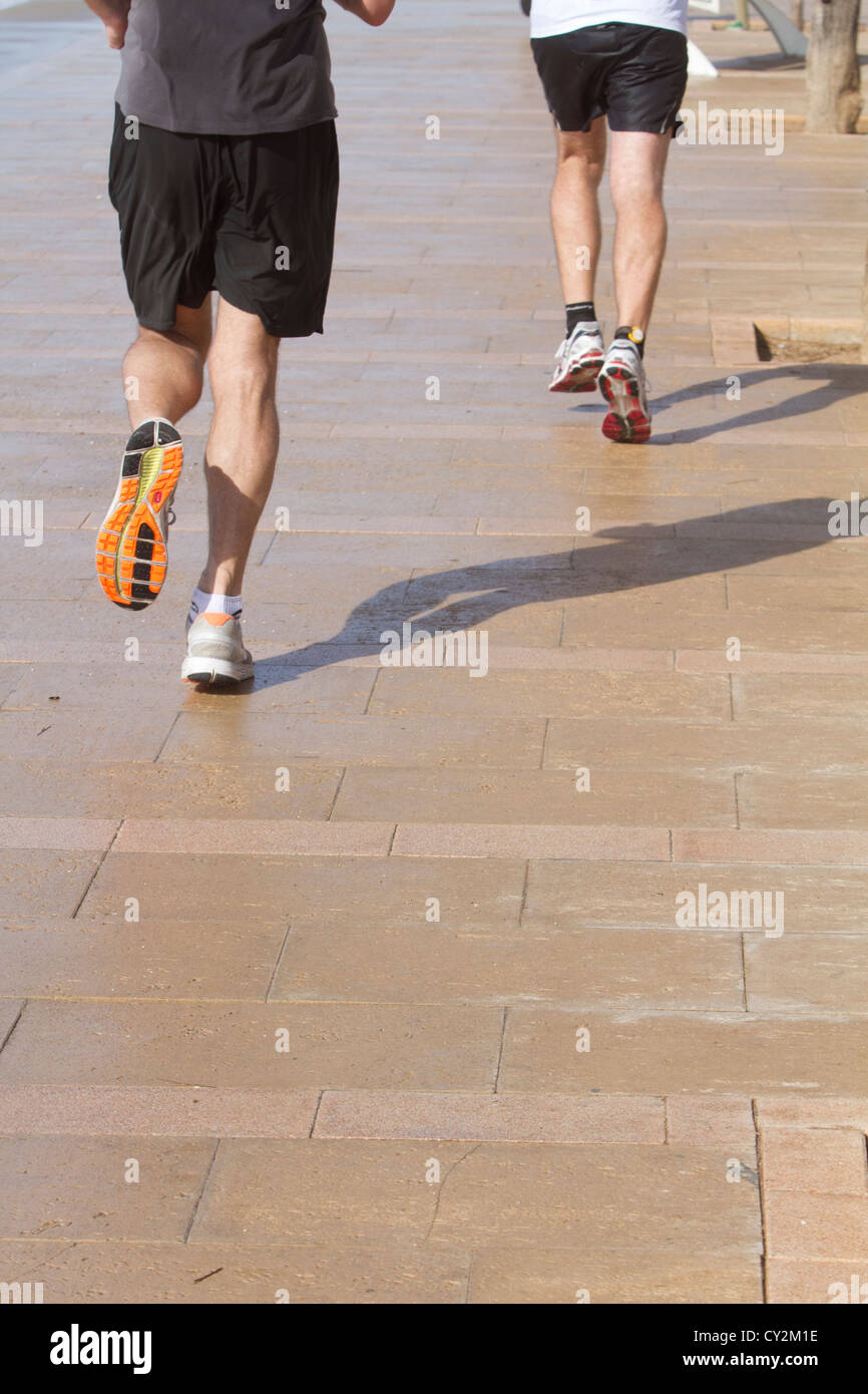 runners legs athletes Marathon running Stock Photo - Alamy