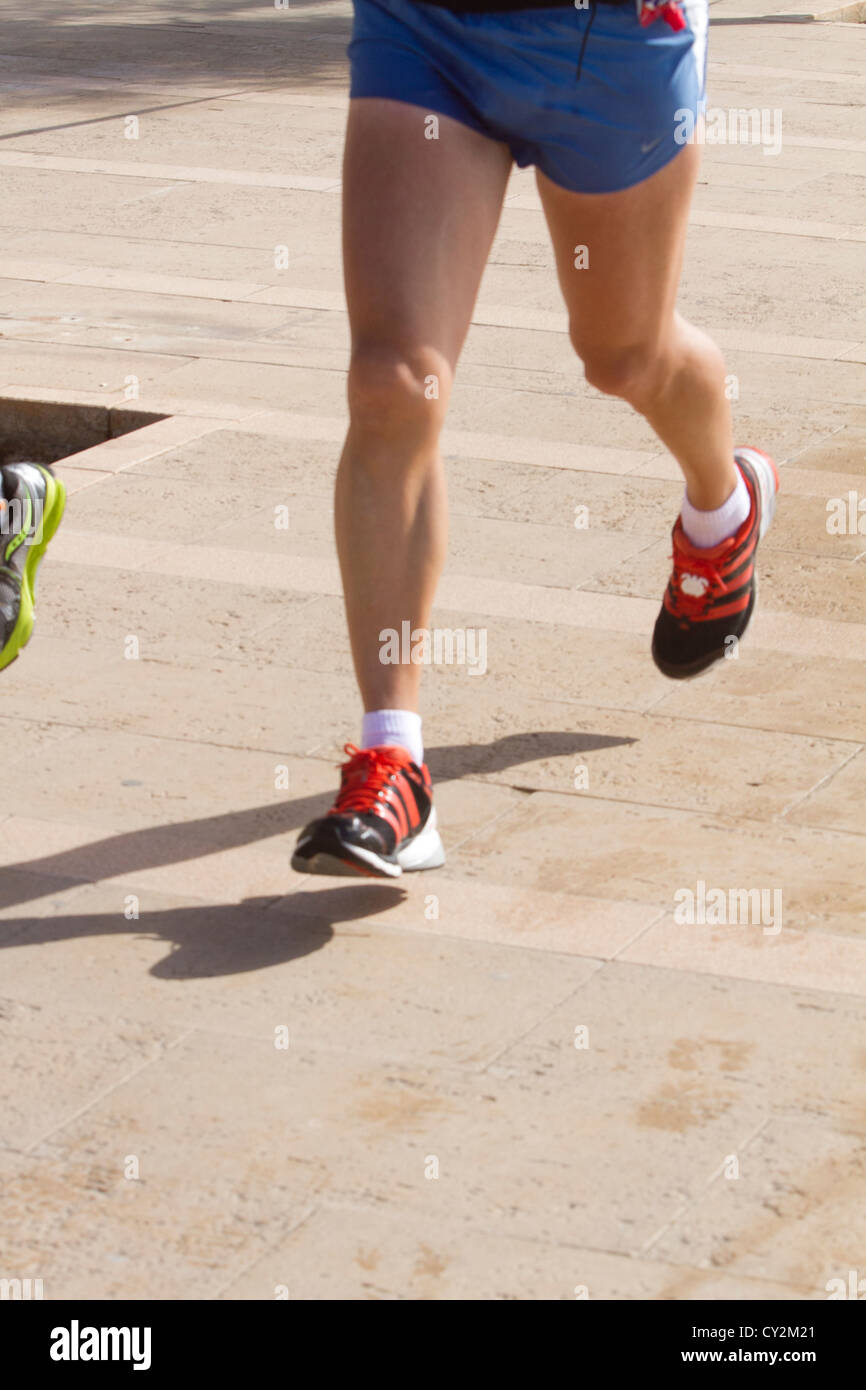 runner legs running athlete Marathon racing Stock Photo - Alamy