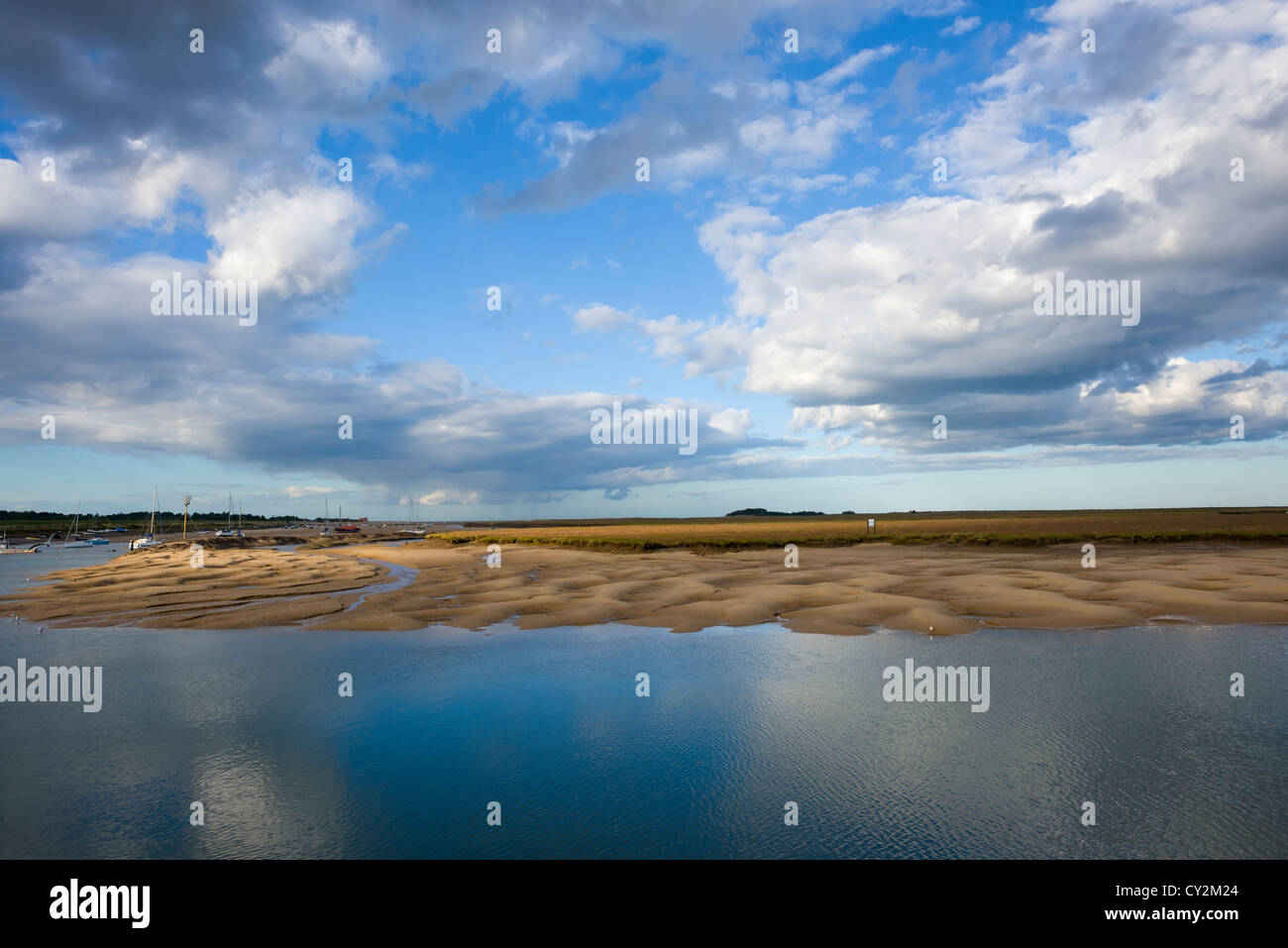 View from Wells Quay looking north showing tidal sandbank with dramatic ...
