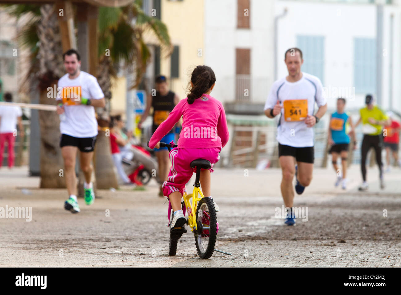 Marathon runners men race athletes running on road Palma de Mallorca ...