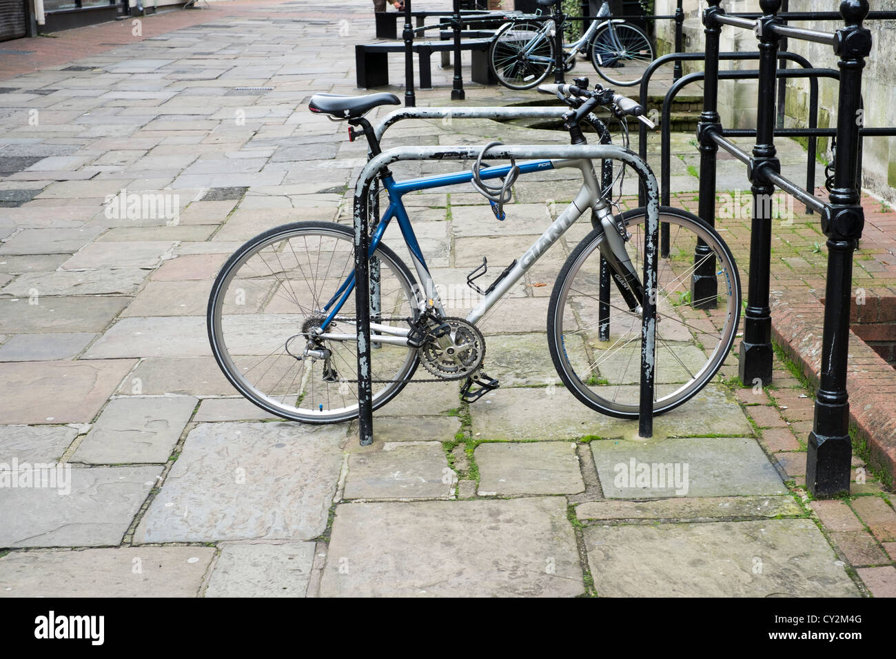 Expensive bicycle securely locked to steel railing Stock Photo - Alamy Expensive bicycle securely locked to steel railing Stock Photo - Alamy