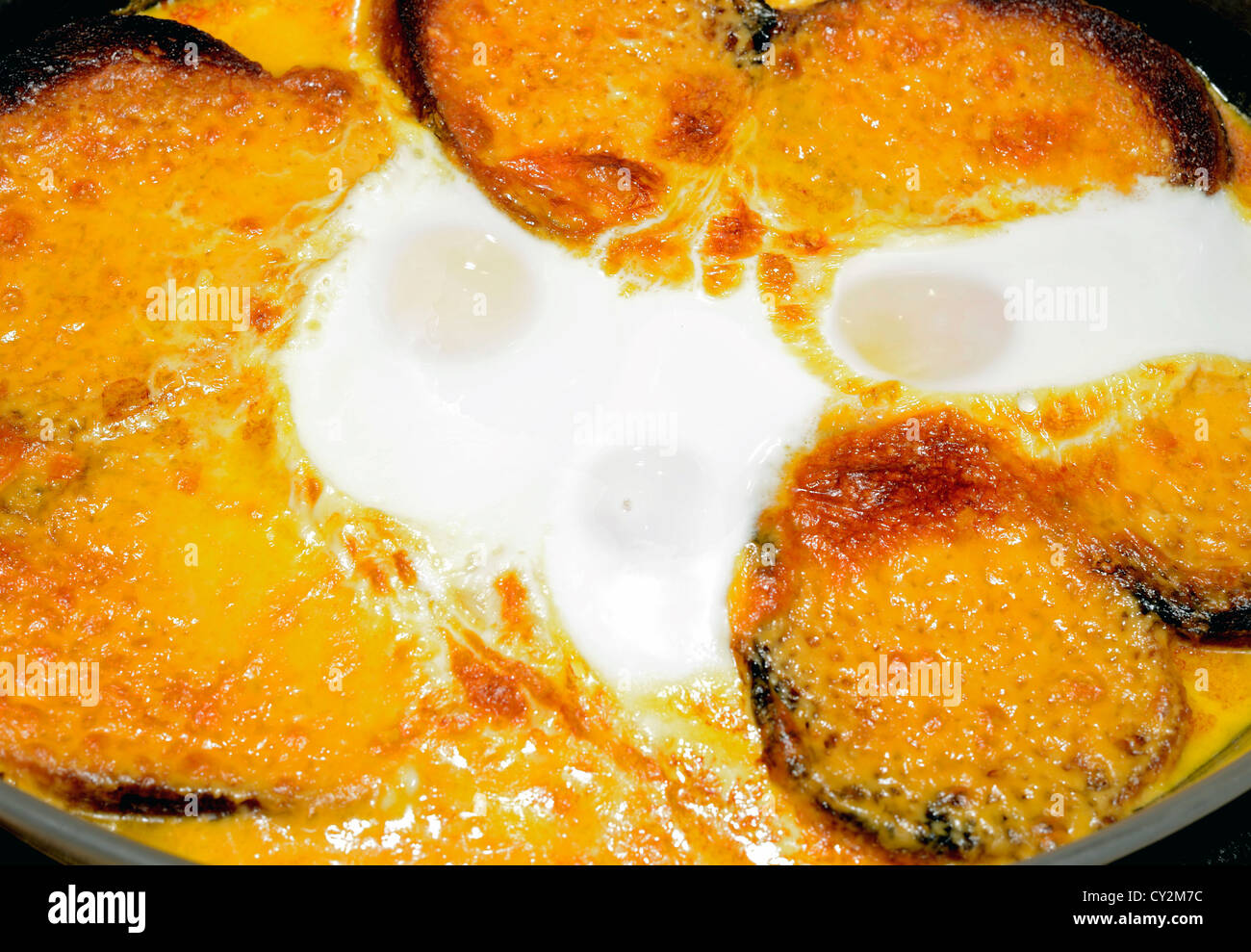 A Welsh rabbit -a mix of cheddar cheese, egg, bier,mustard on toast. A ...