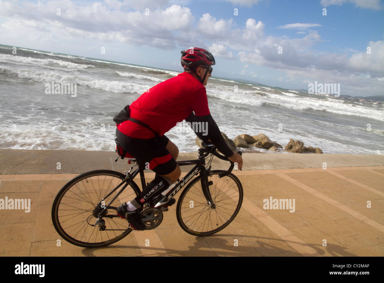 Seaside cyclist hi-res stock photography and images - Alamy