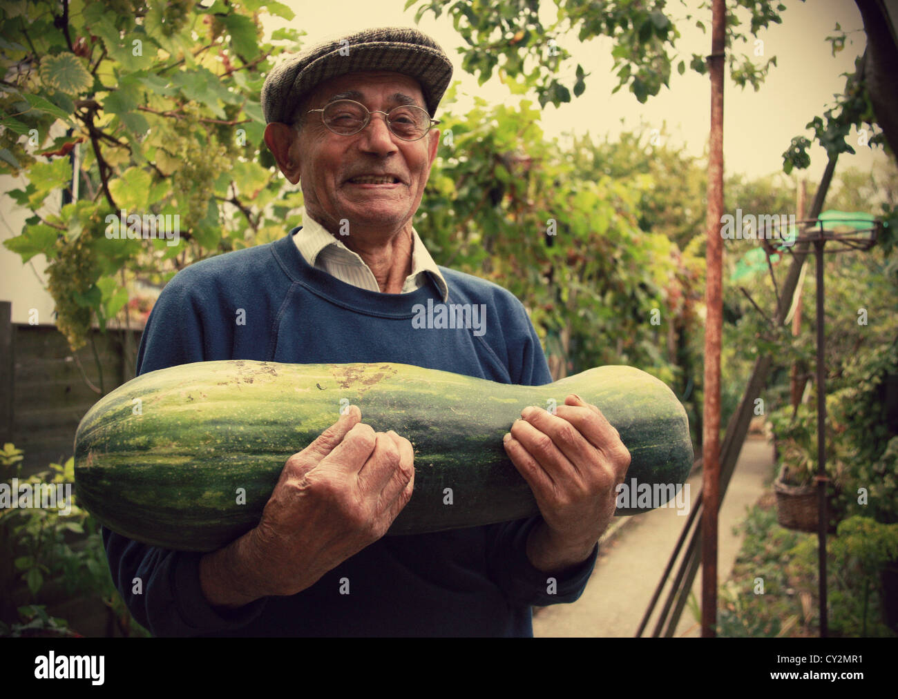 Smiling man big zucchini hi-res stock photography and images - Alamy