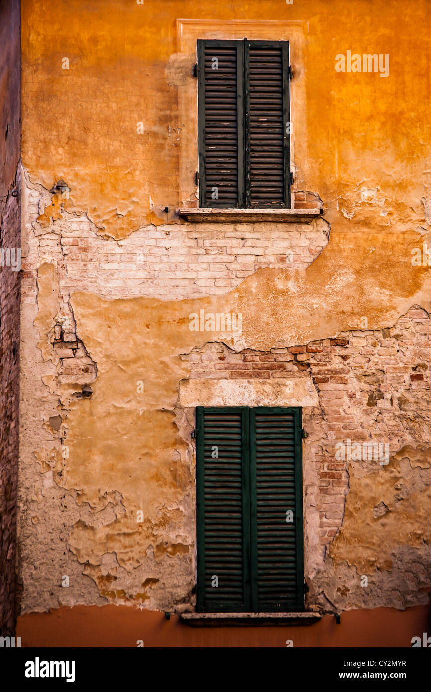 WIndows and Textured Wall Stock Photo - Alamy