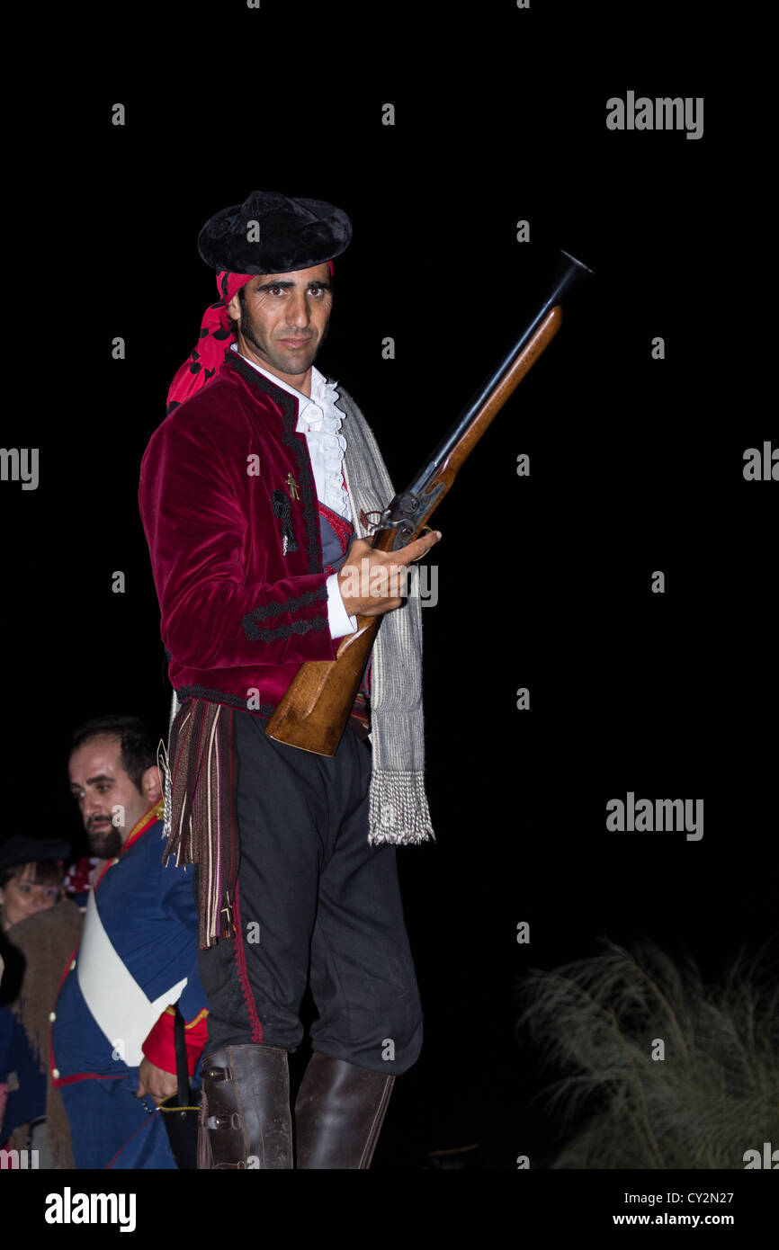 Unidentified bandit at historical reenactment of 1840's spanish world ...