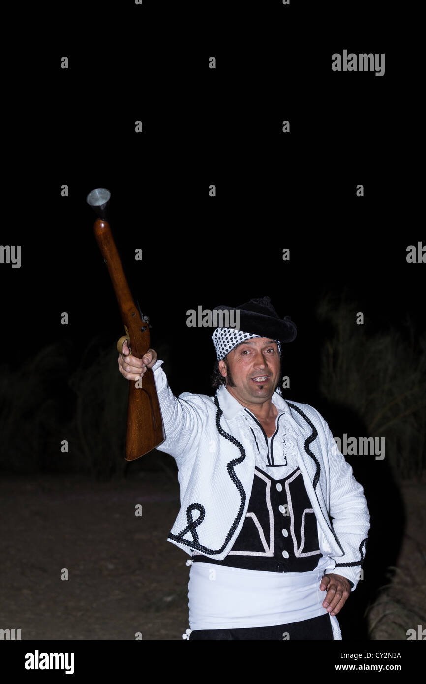 Unidentified bandit at historical reenactment of 1840's spanish world ...