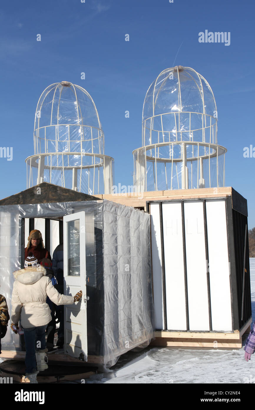 People entering a shanty at the Art Shanty Project in Minneapolis Stock ...