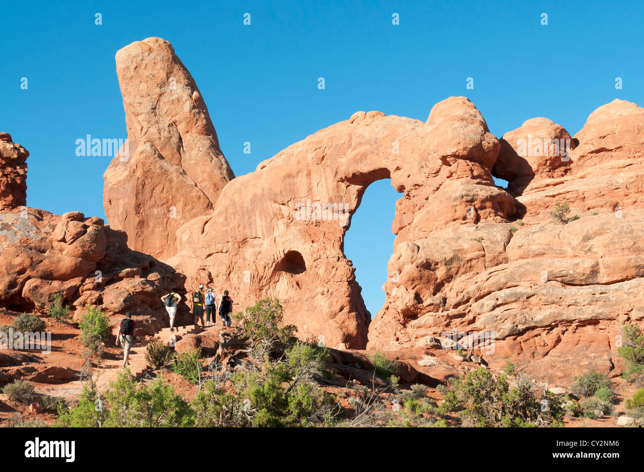 Utah, Arches National Park, visitors on Windows Trail, Turret Arch ...