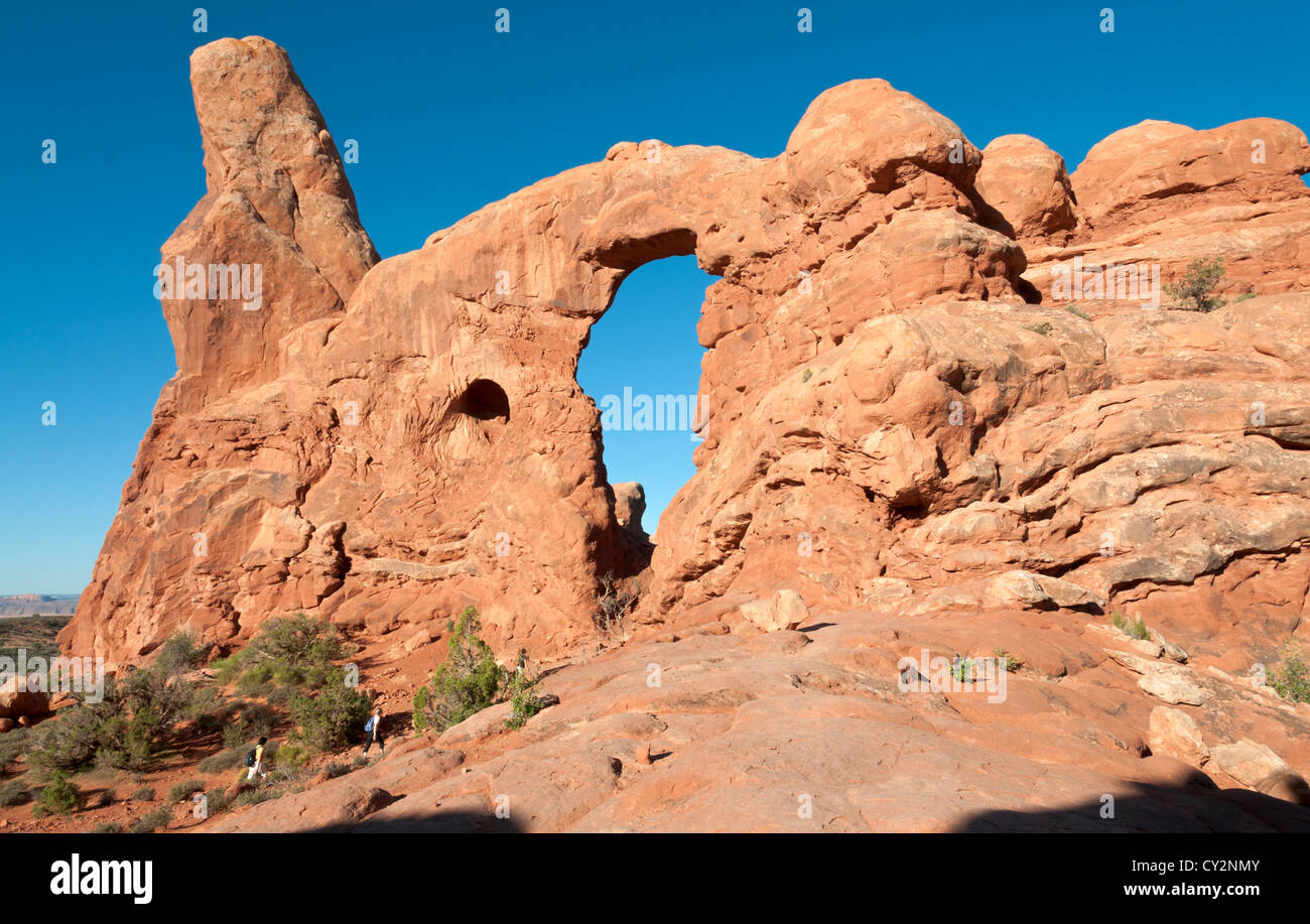 Utah, Arches National Park, visitors on Windows Trail, Turret Arch ...