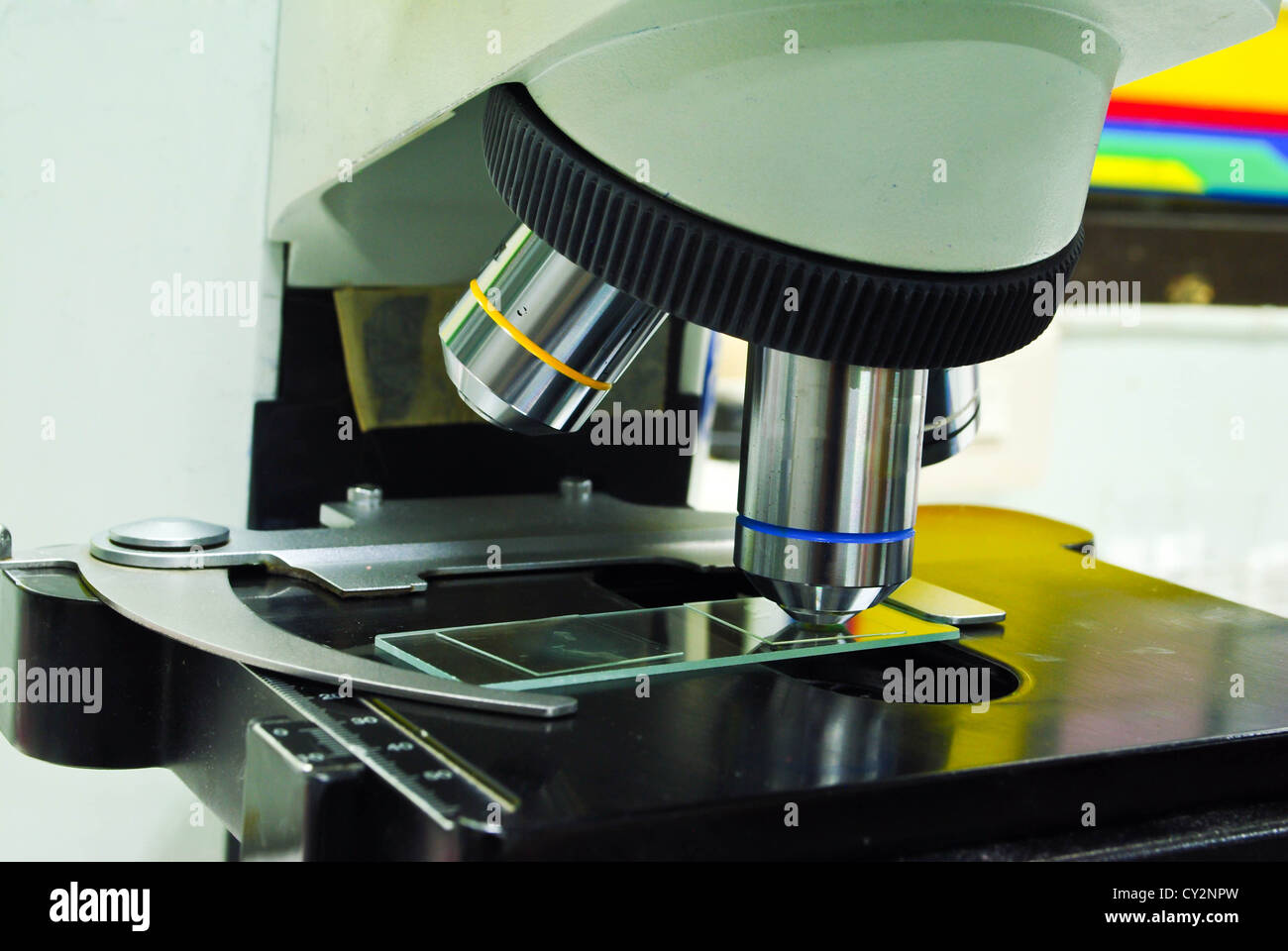 Researcher studying chemical element in hi-res stock photography and ...