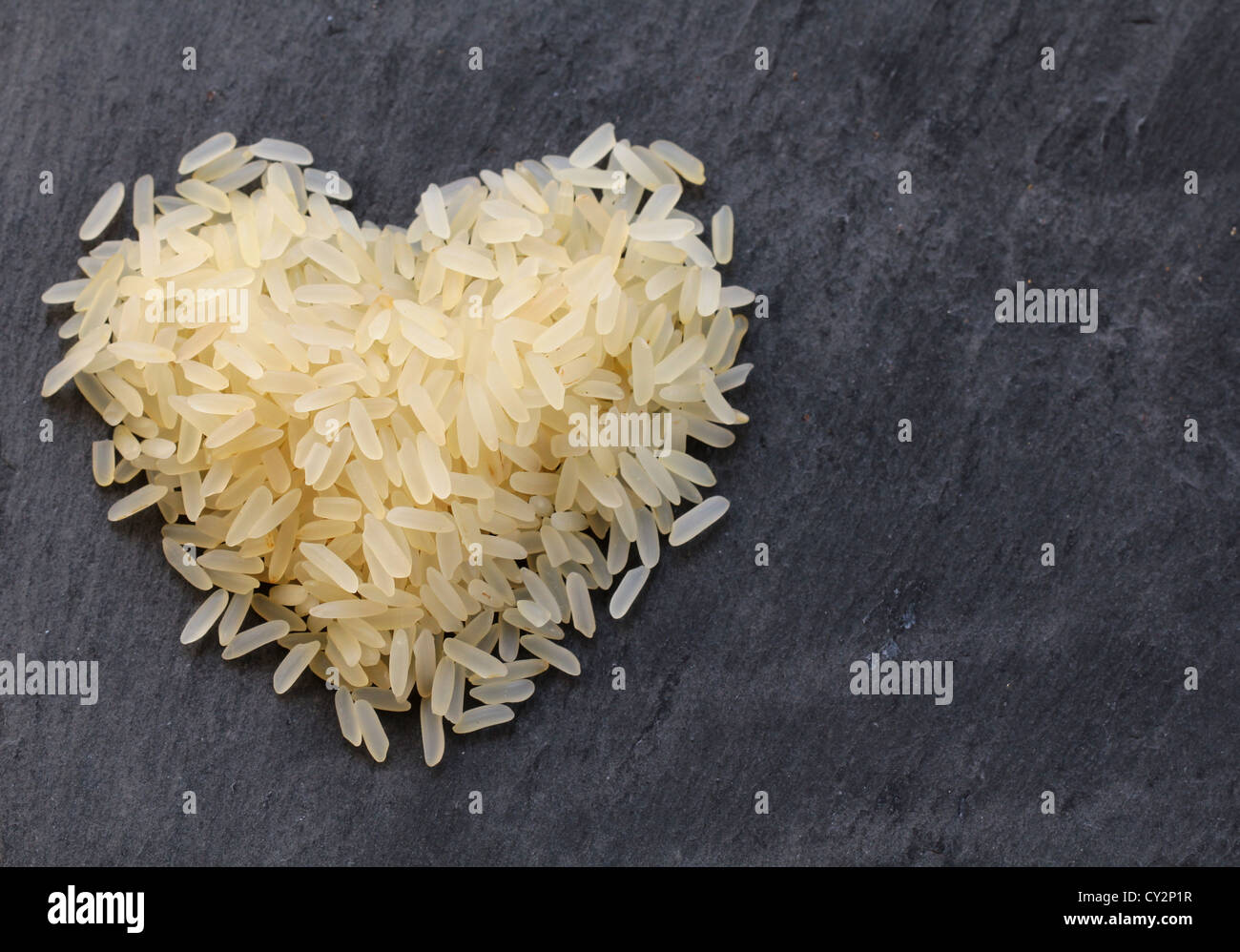 pile of white rice in heart shape Stock Photo - Alamy