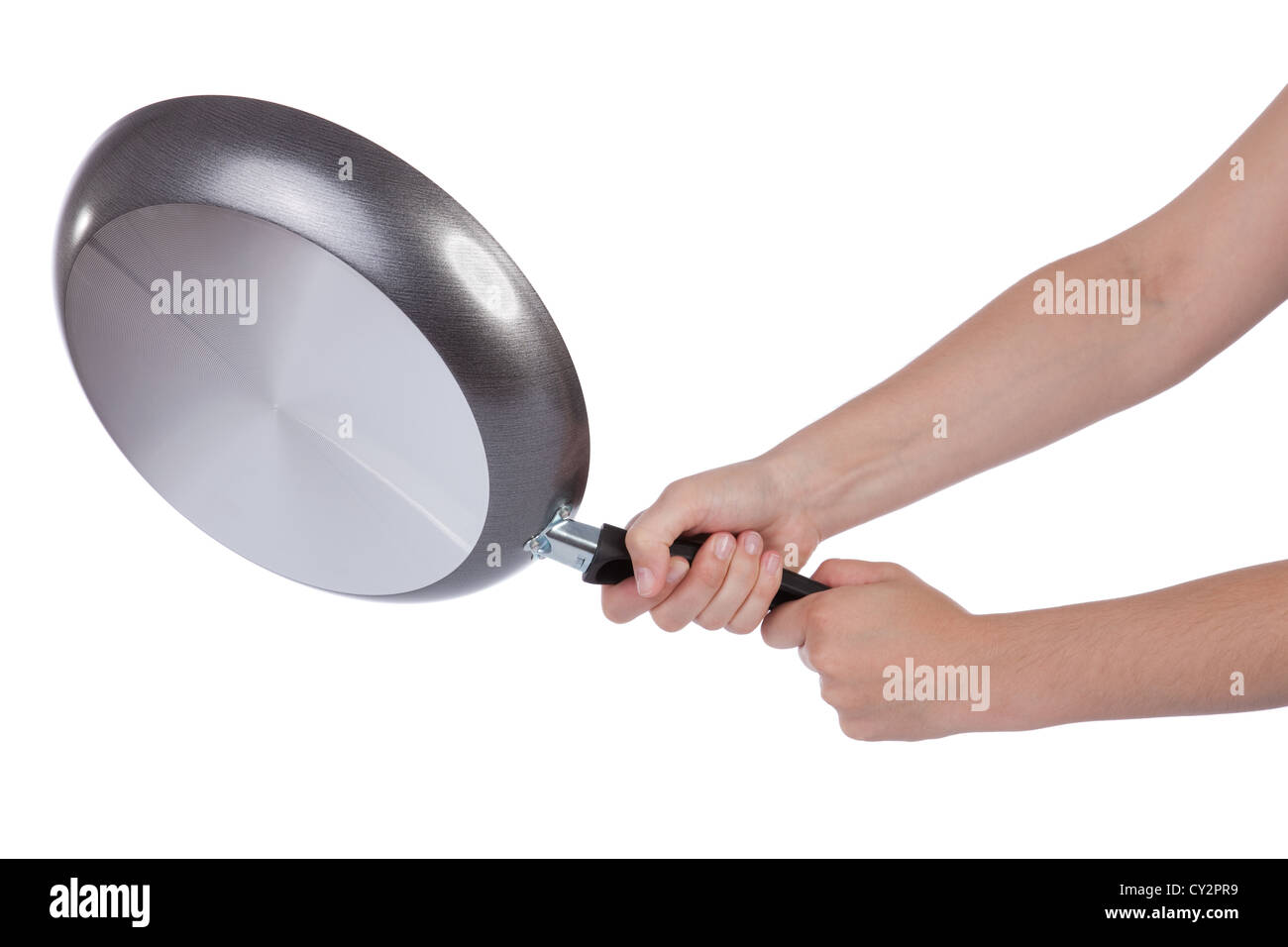 Woman beating with a frying pan isolated on white Stock Photo - Alamy