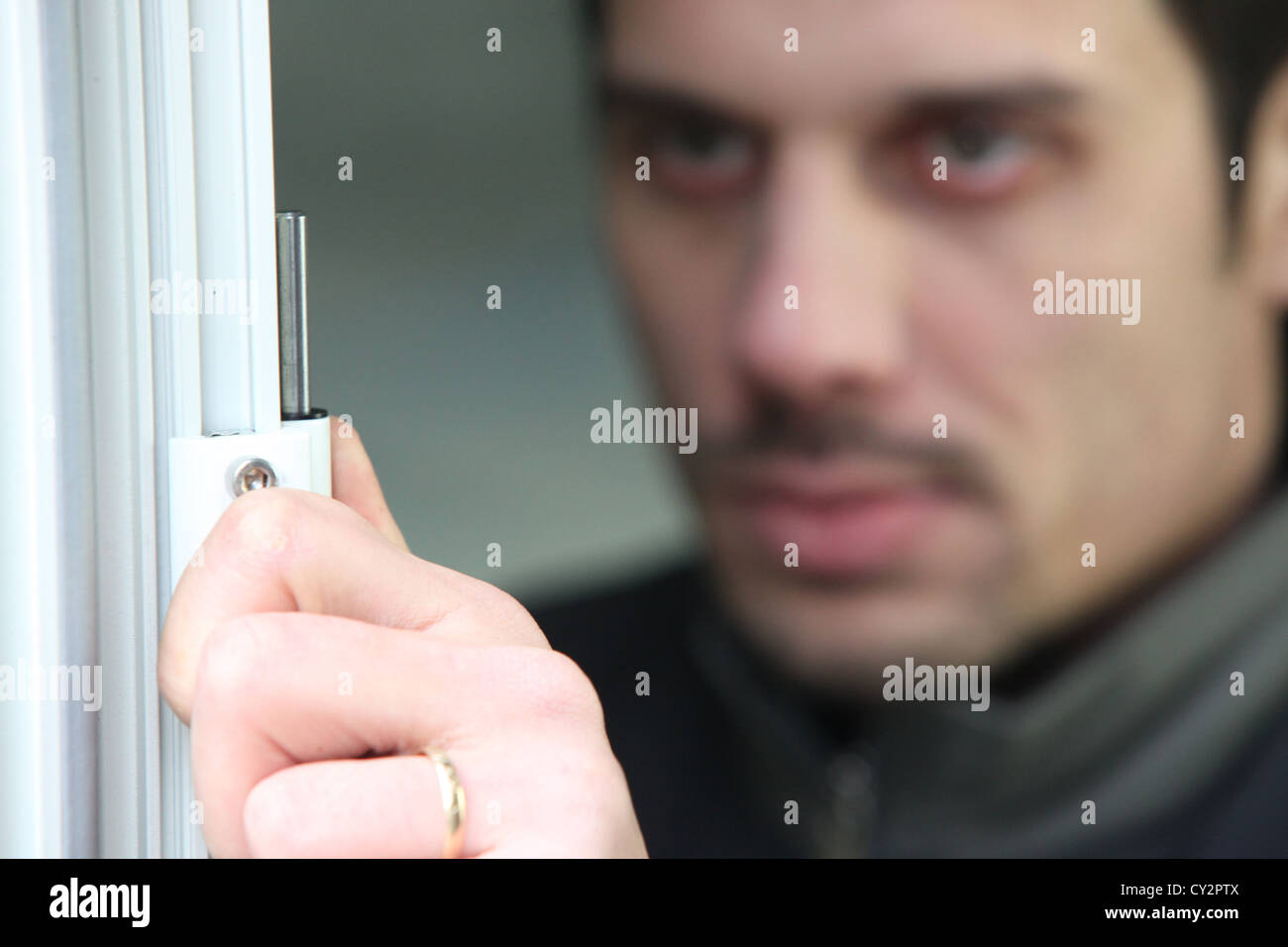 Man fitting new upvc windows Stock Photo - Alamy