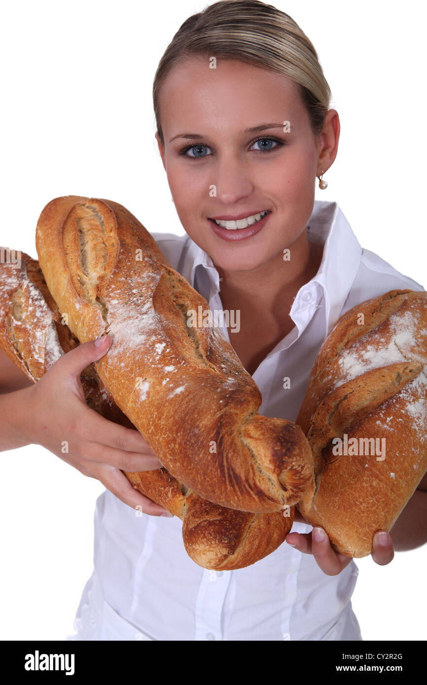 Young female baker giving hi-res stock photography and images - Alamy