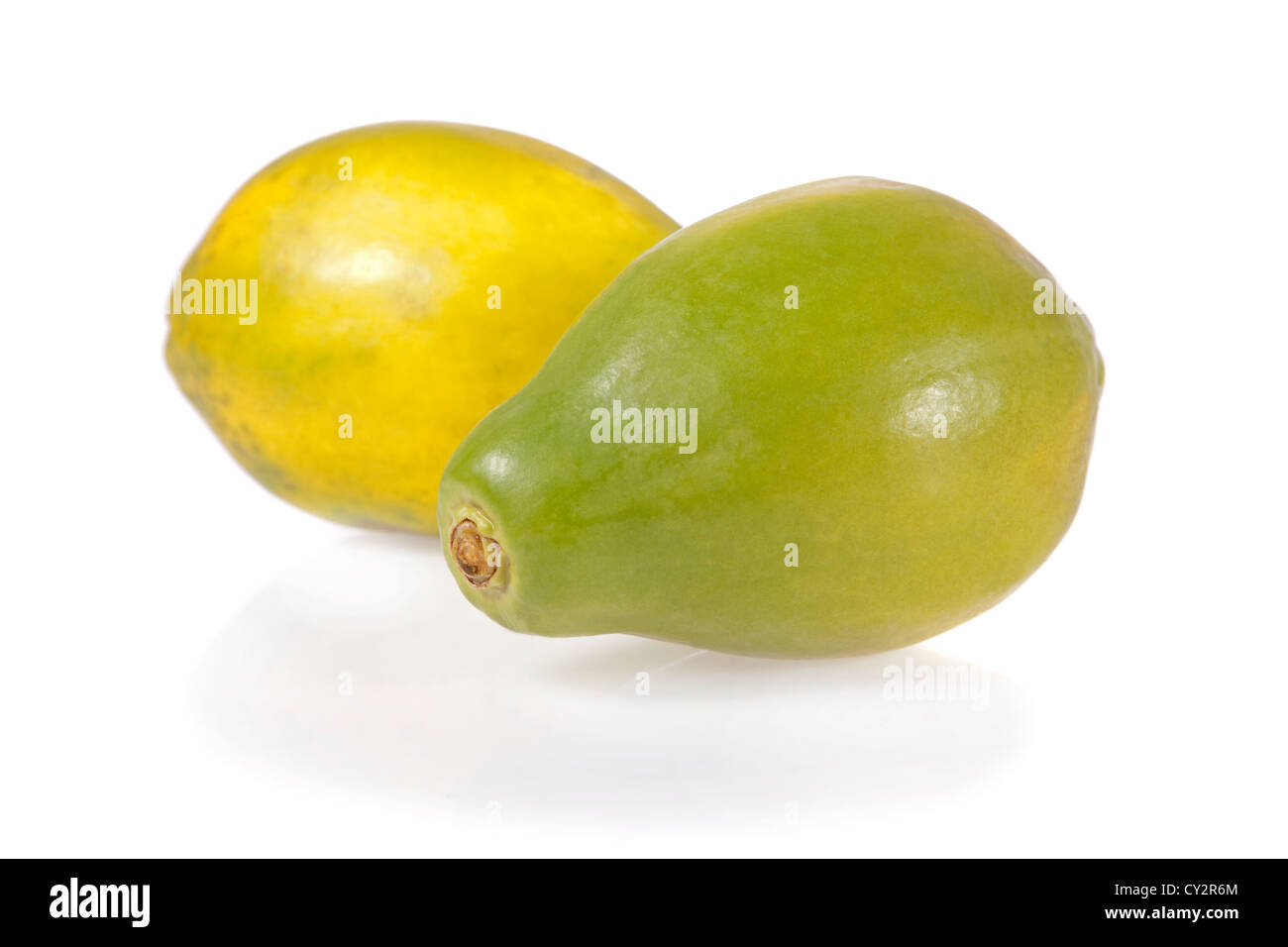 Ripe papayas isolated on a white background Stock Photo - Alamy